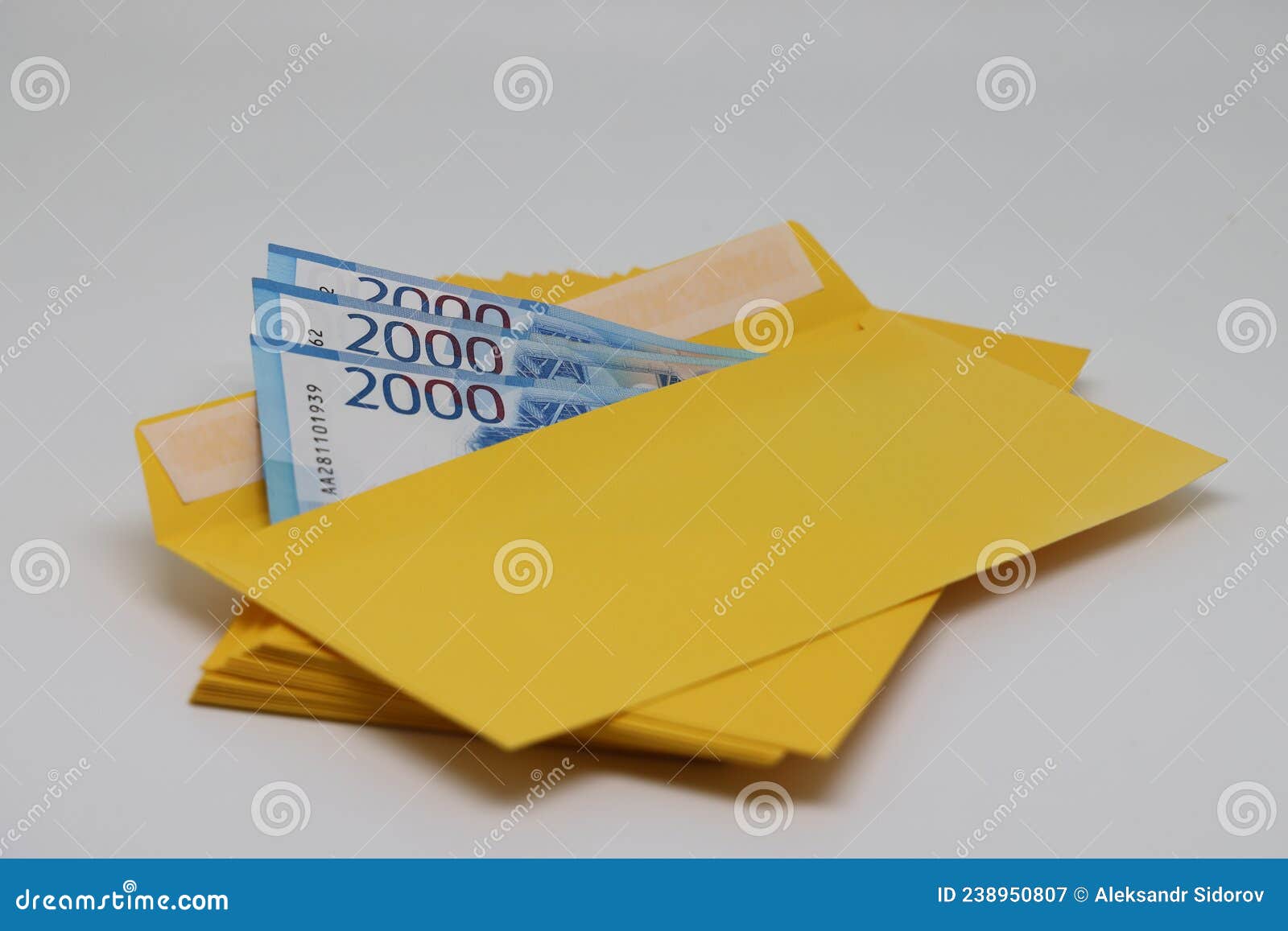 A Stack of Envelopes. Close-up with an Envelope Full of Euro Banknotes ...