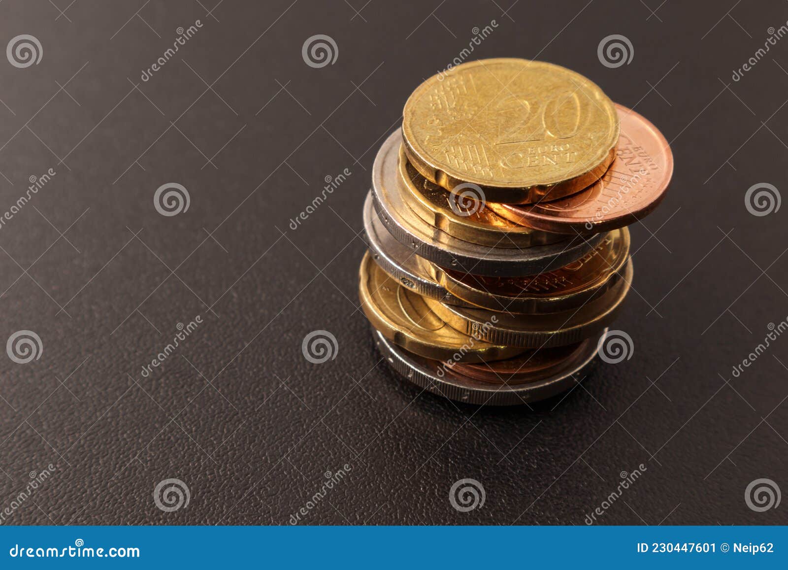 Stack of Euro and Euro Cent Coins Close-up on a Black Background Stock ...
