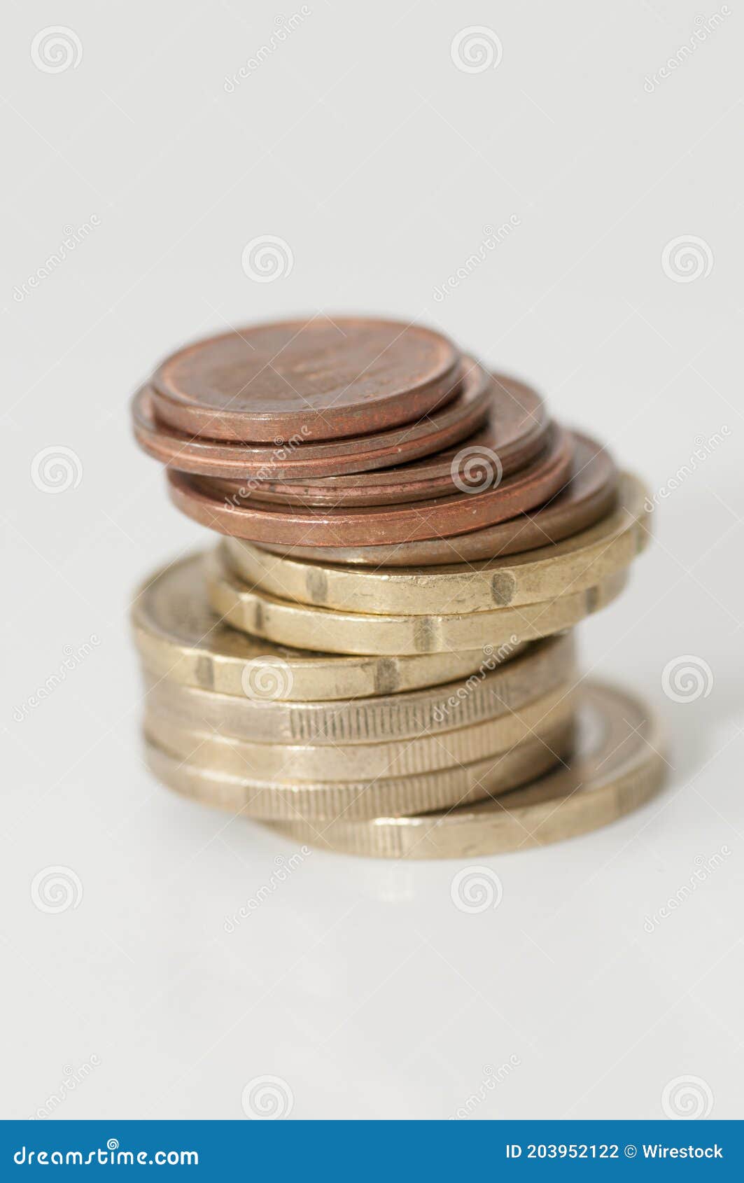 Stack of Euro and Euro Cent Coins on the Gray Background, the Concept ...
