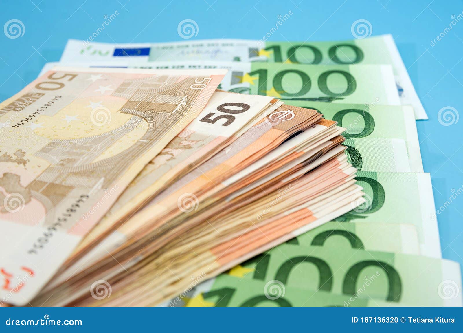 Stack with 50 Euros on the Background of Banknotes of 100 Euros. Close ...