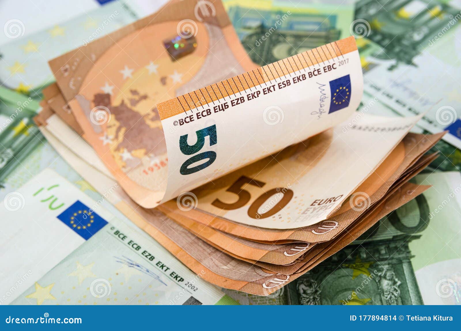 Stack of 50 Euros on a Background of Euro Banknotes. Stock Photo ...