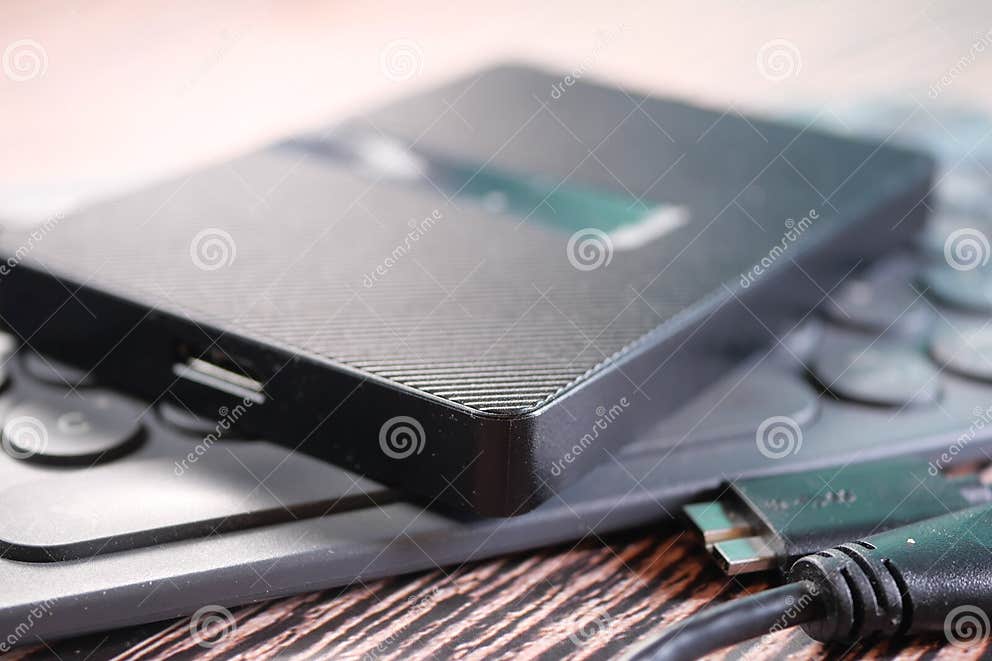 External Hard Drives on a Keyboard on Table Stock Photo - Image of ...