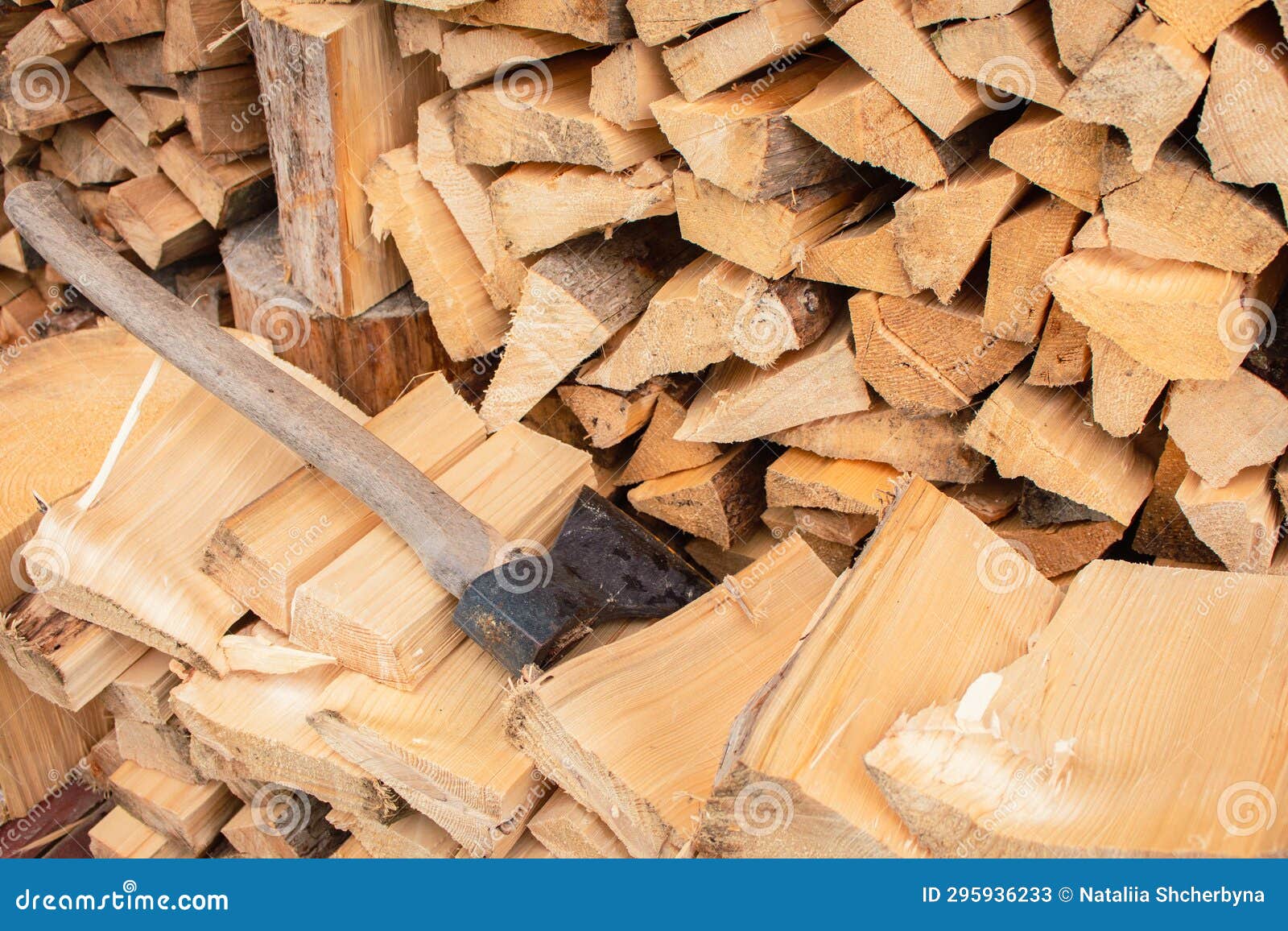 Stack of Firewood with Axe. Chopped Logs with Old Axe. Woodpile ...