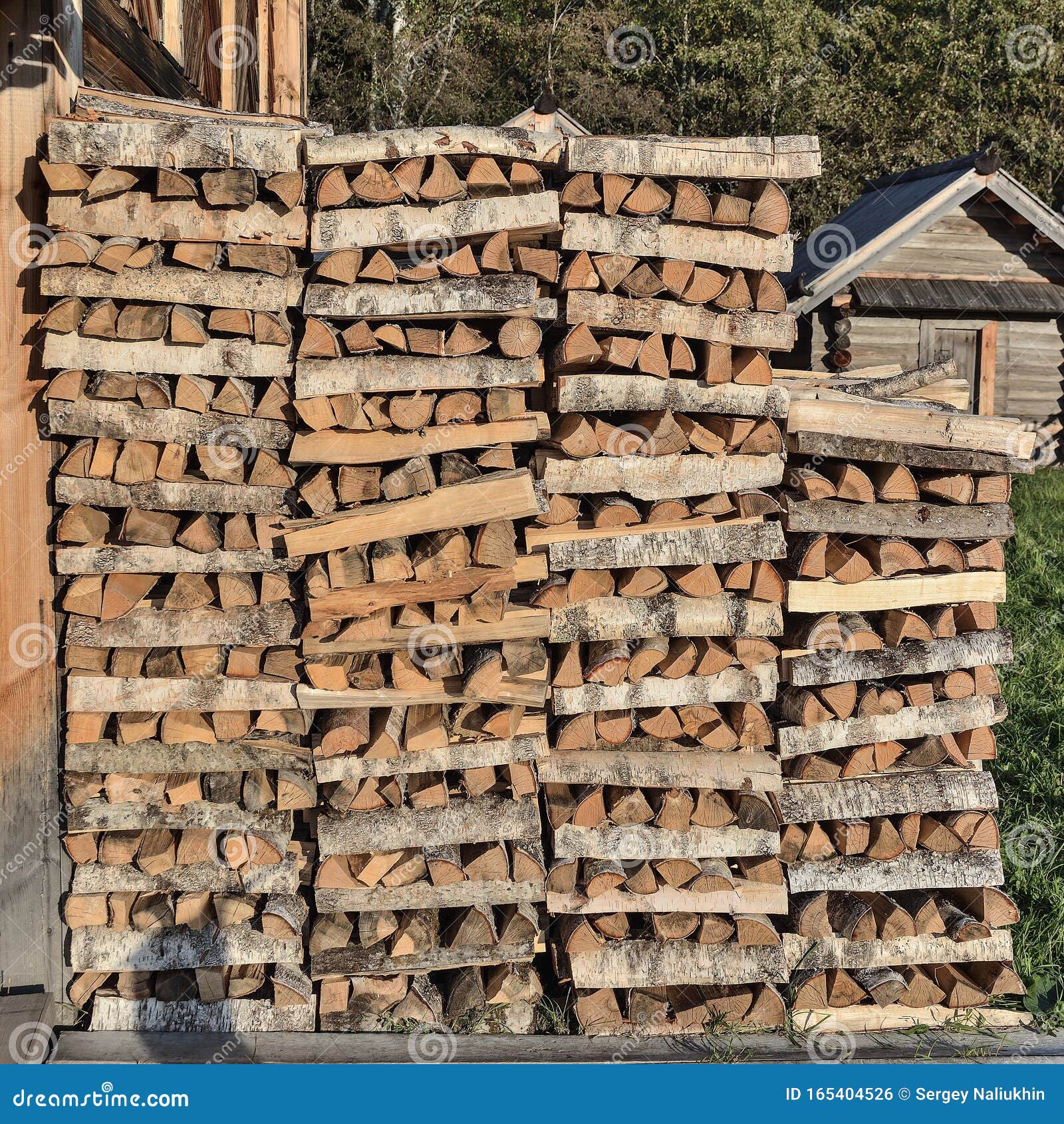 Stack of Firewood at the Wall of the House Stock Photo - Image of ...