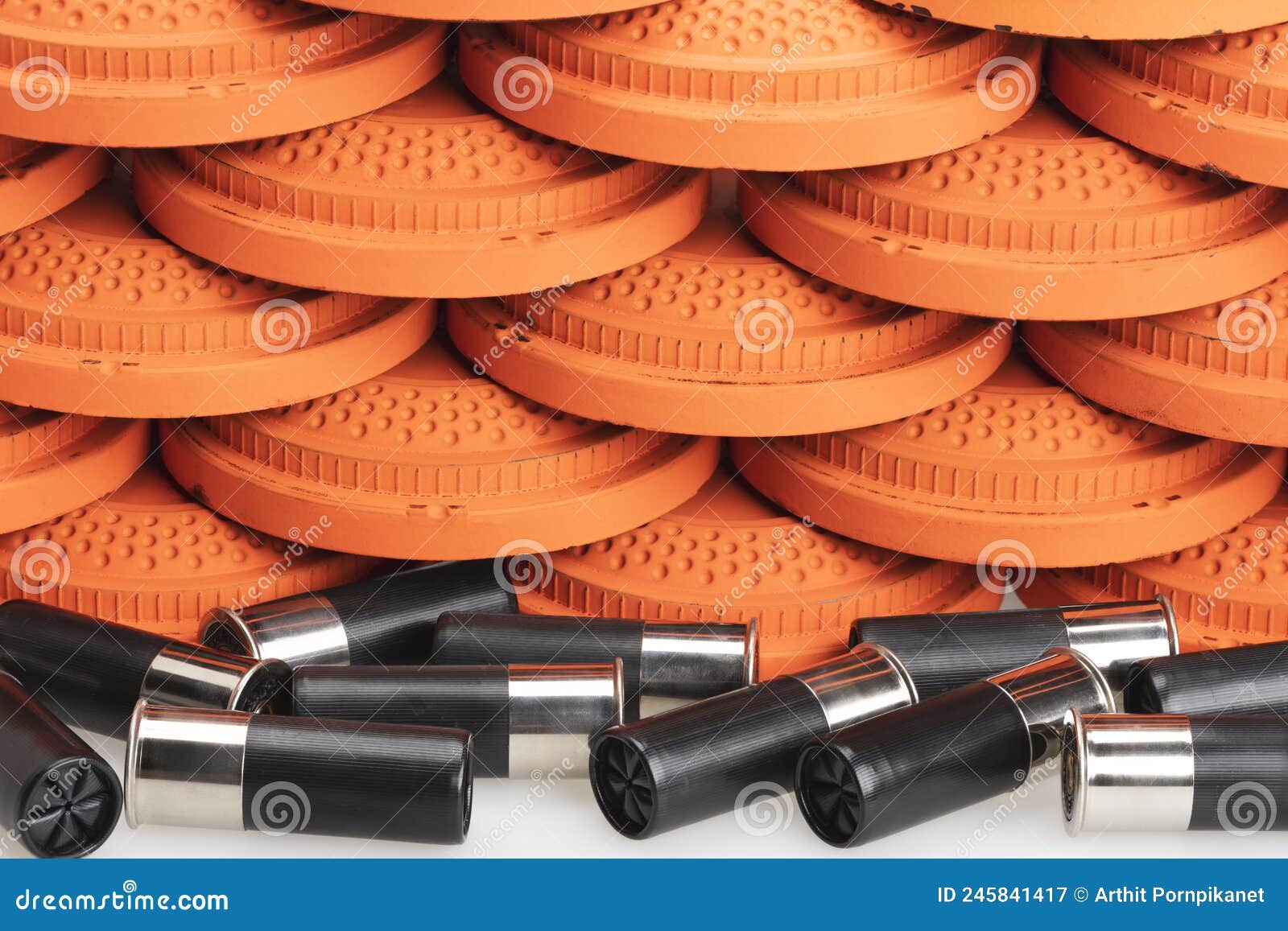 Stack of Flying Clay Pigeon Targets and Shotgun Shell Bullets on White ...