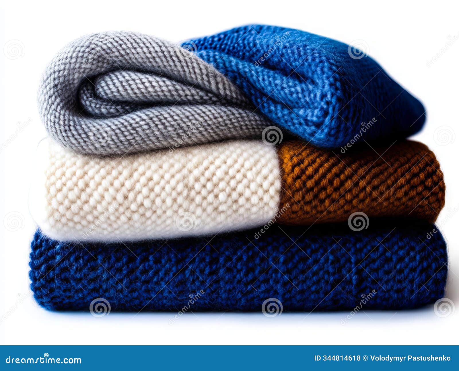 A Stack of Folded Blankets on a White Background Stock Photo - Image of ...