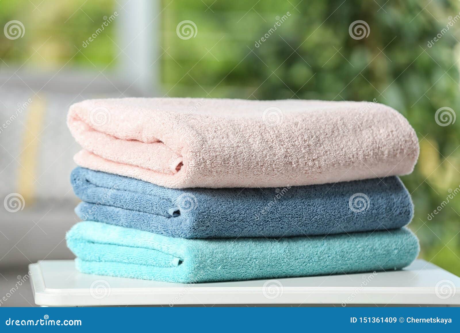 Stack of Folded Clean Soft Towels on Table, Closeup Stock Image - Image ...