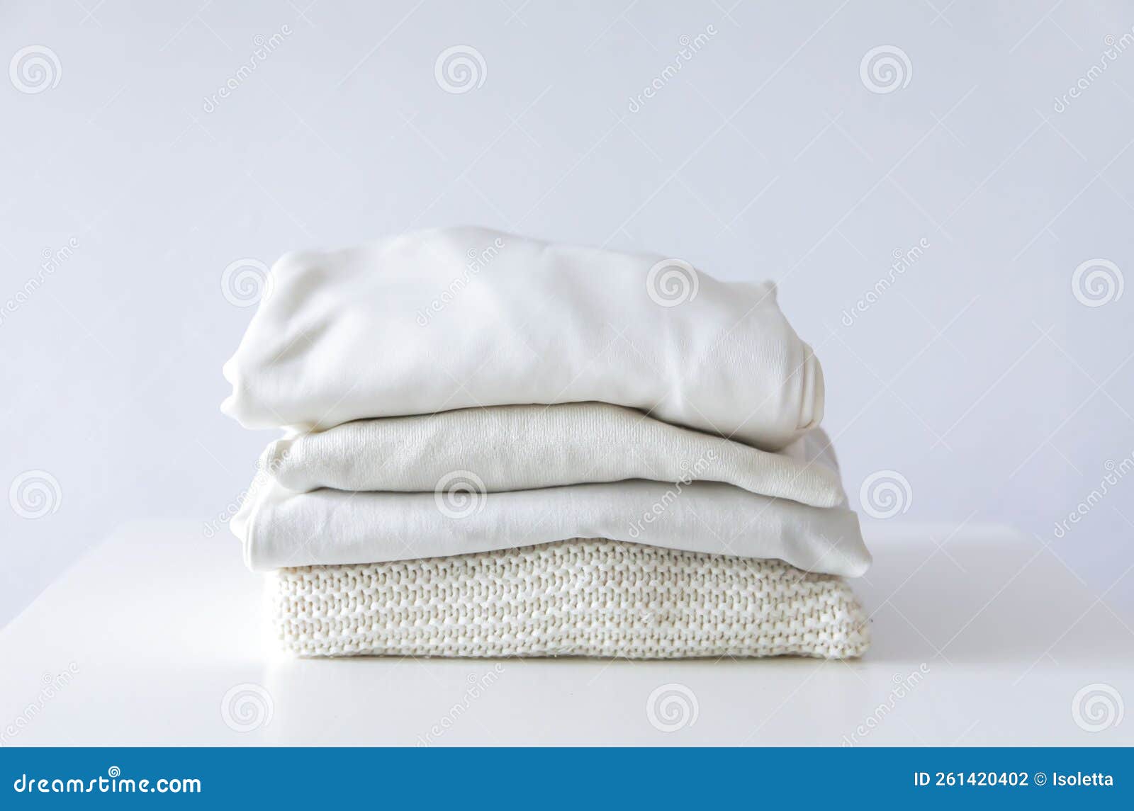 Stack of Folded Colorful Clothes. Compact Storage Organizing Stock ...