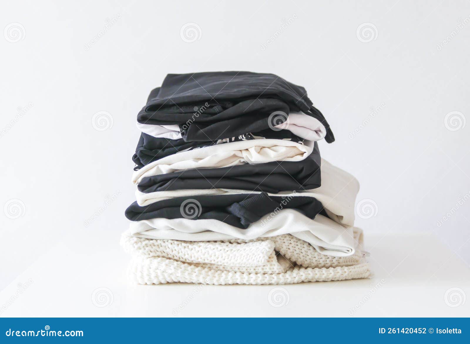 Stack of Folded Colorful Clothes. Compact Storage Organizing Stock ...