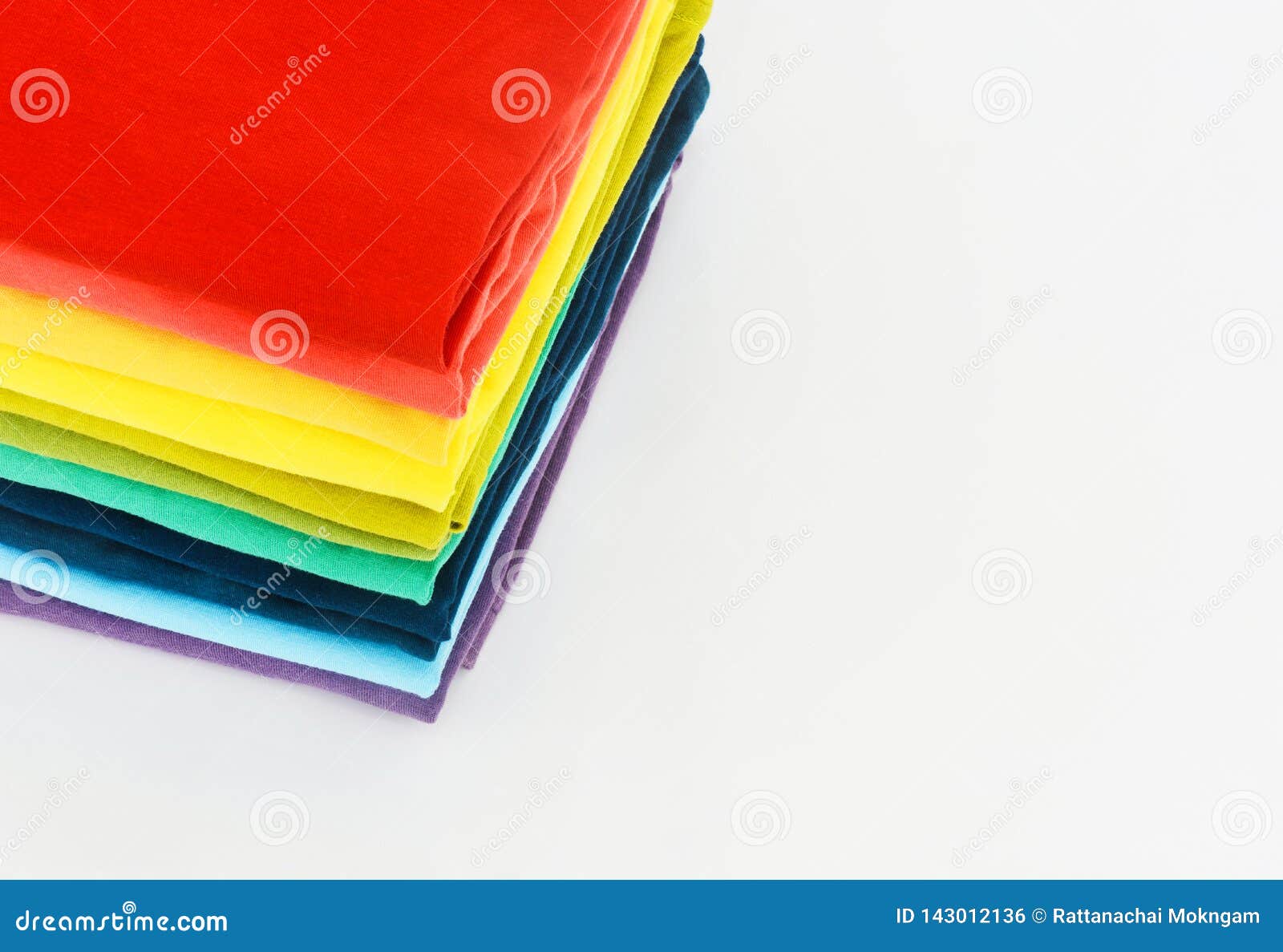 Stack of Folded Colorful T-shirt on White Background Stock Photo ...