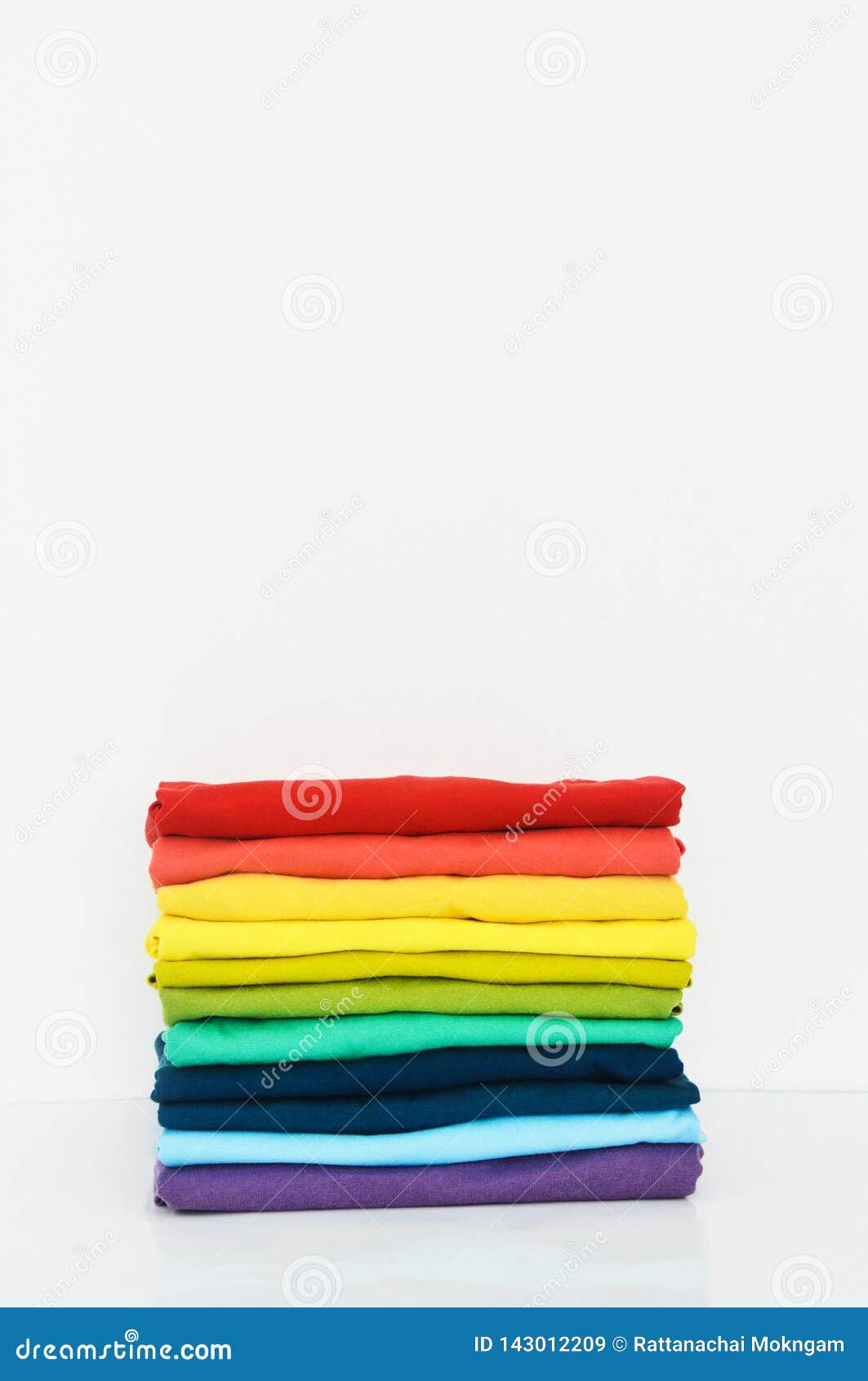 Stack of Folded Colorful T-shirt on White Background Stock Image ...