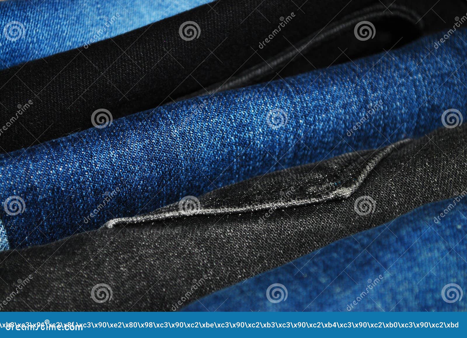 A Stack of Folded Denim Pants Close-up Stock Photo - Image of store ...