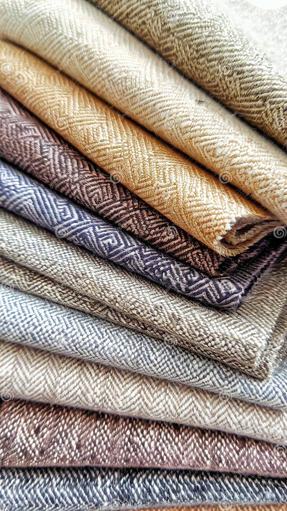 Stack of Folded Fabric Swatches in Various Neutral Tones Stock Photo ...