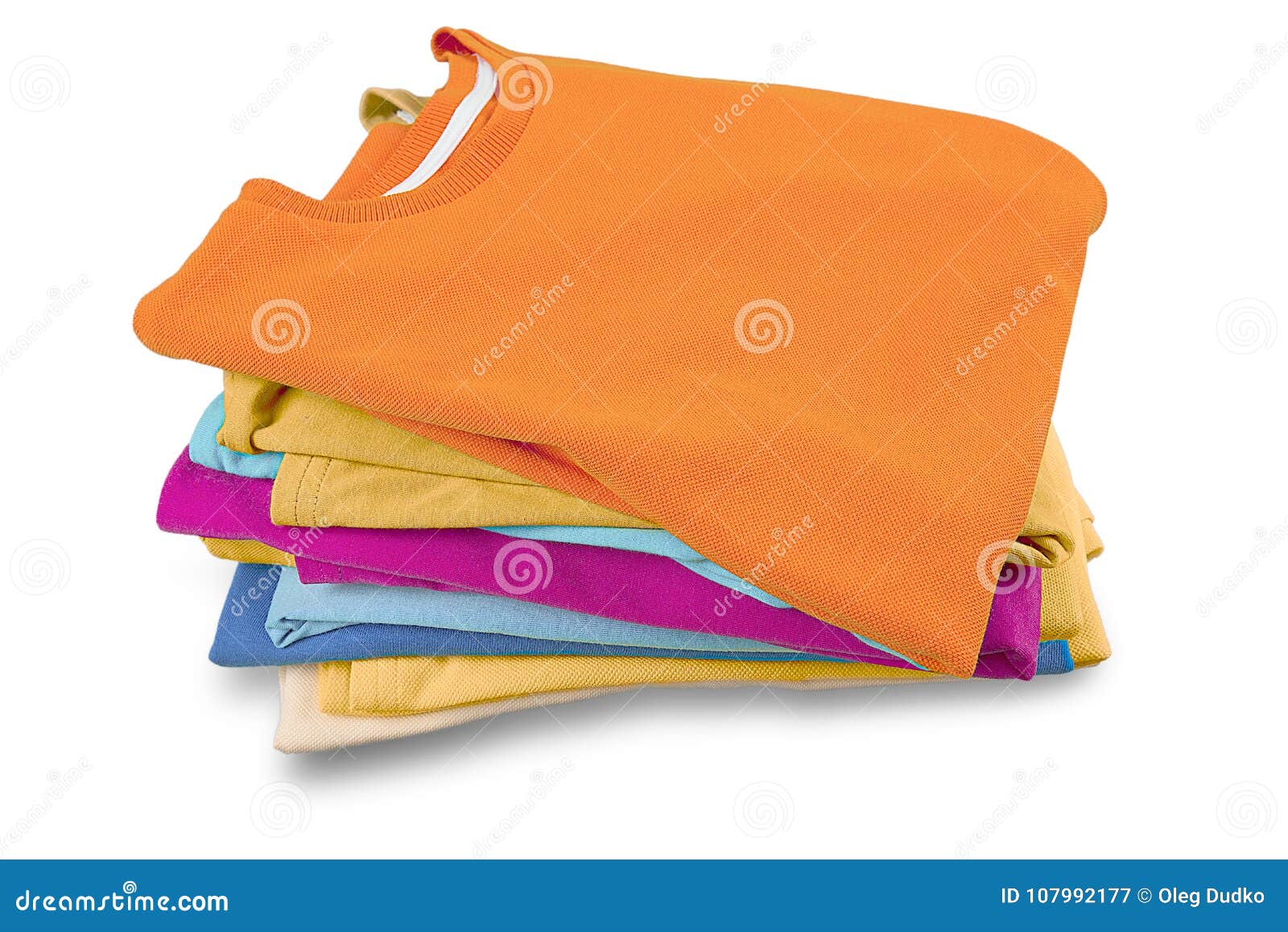 Stack of Folded Garments. Closeup Over White Stock Image - Image of ...