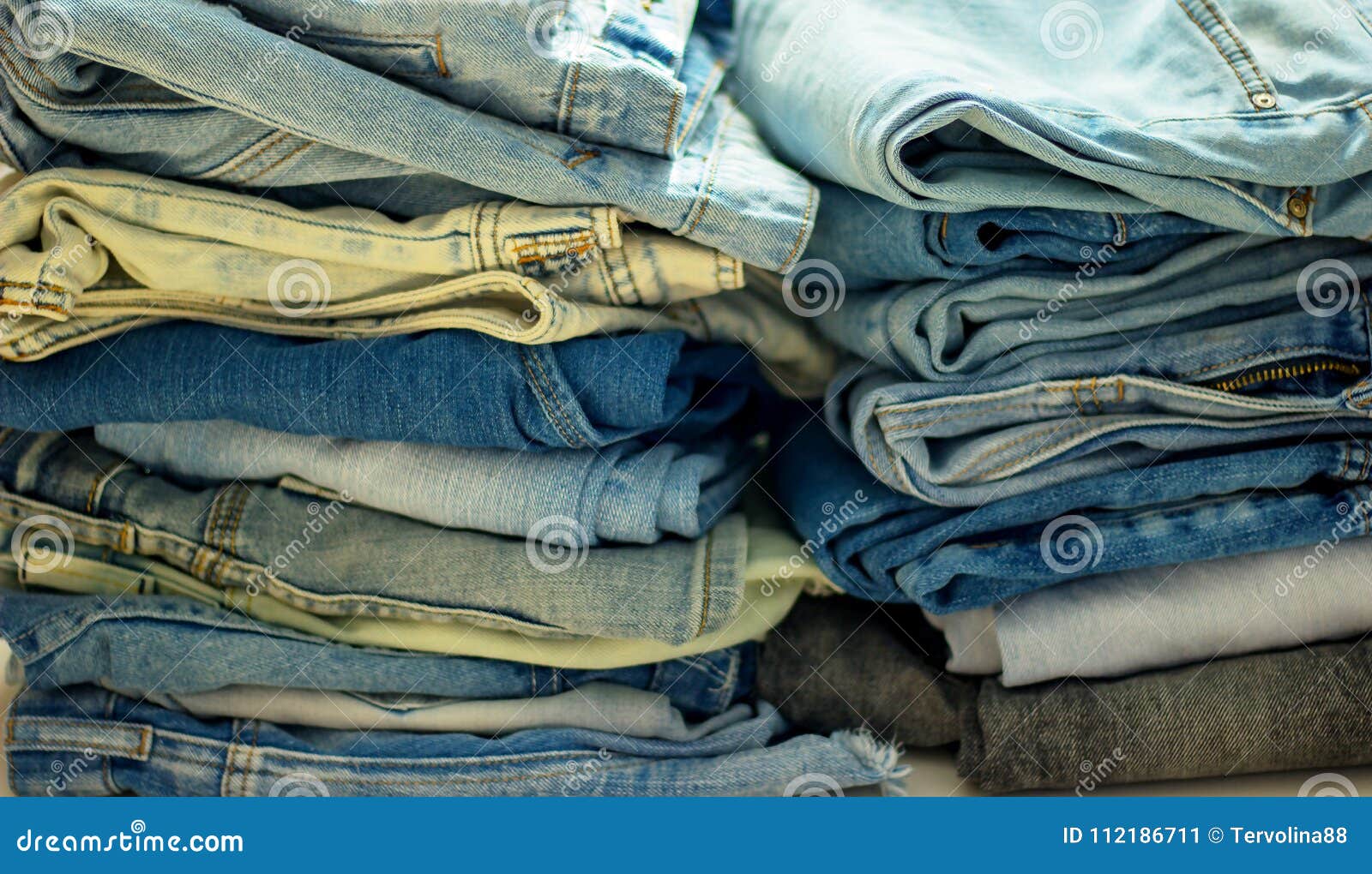 Stack of Folded Jeans of Different Colors Stock Image - Image of ...