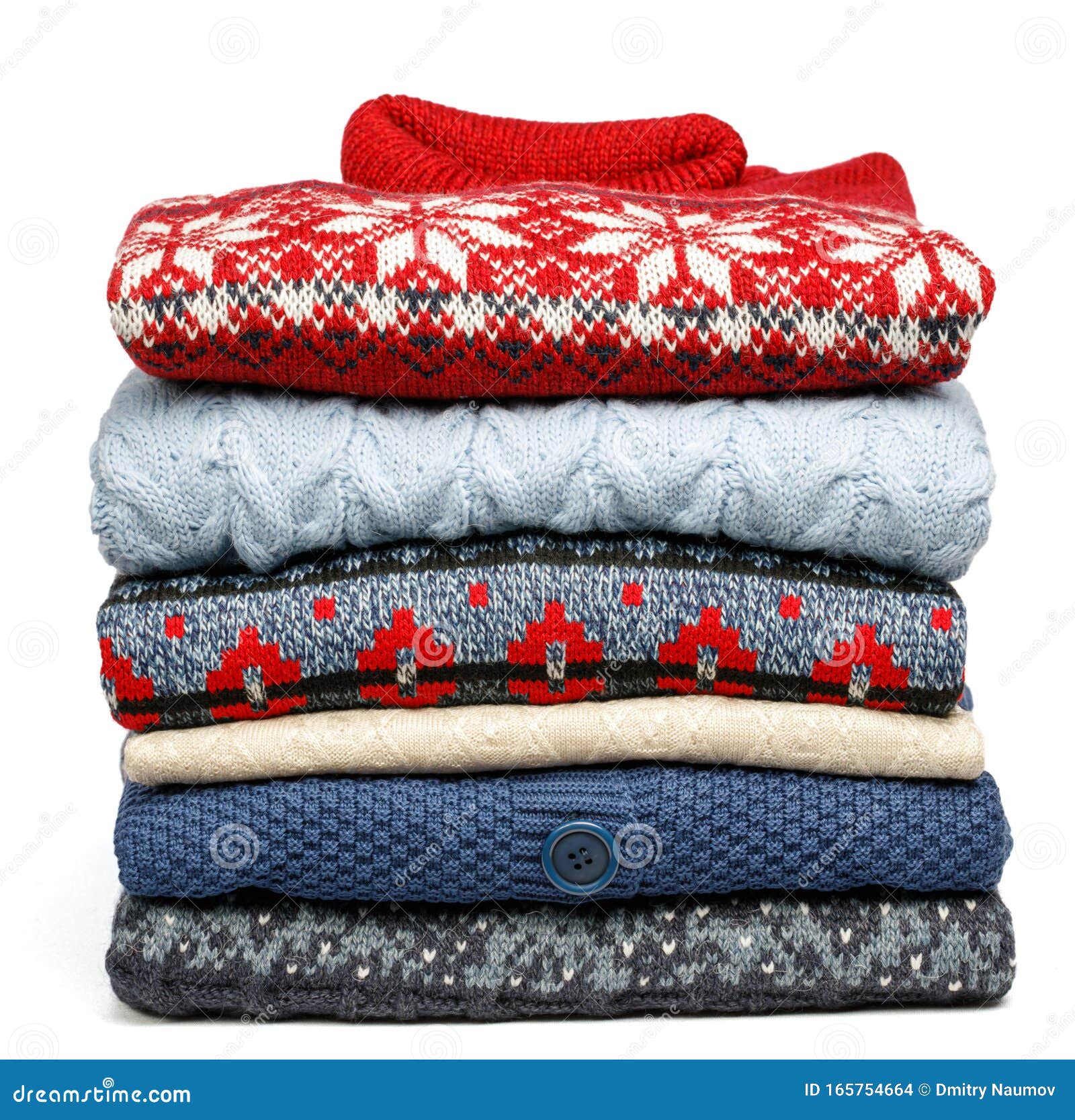Stack of Folded Knitted Sweaters in a Store on White Background Stock ...