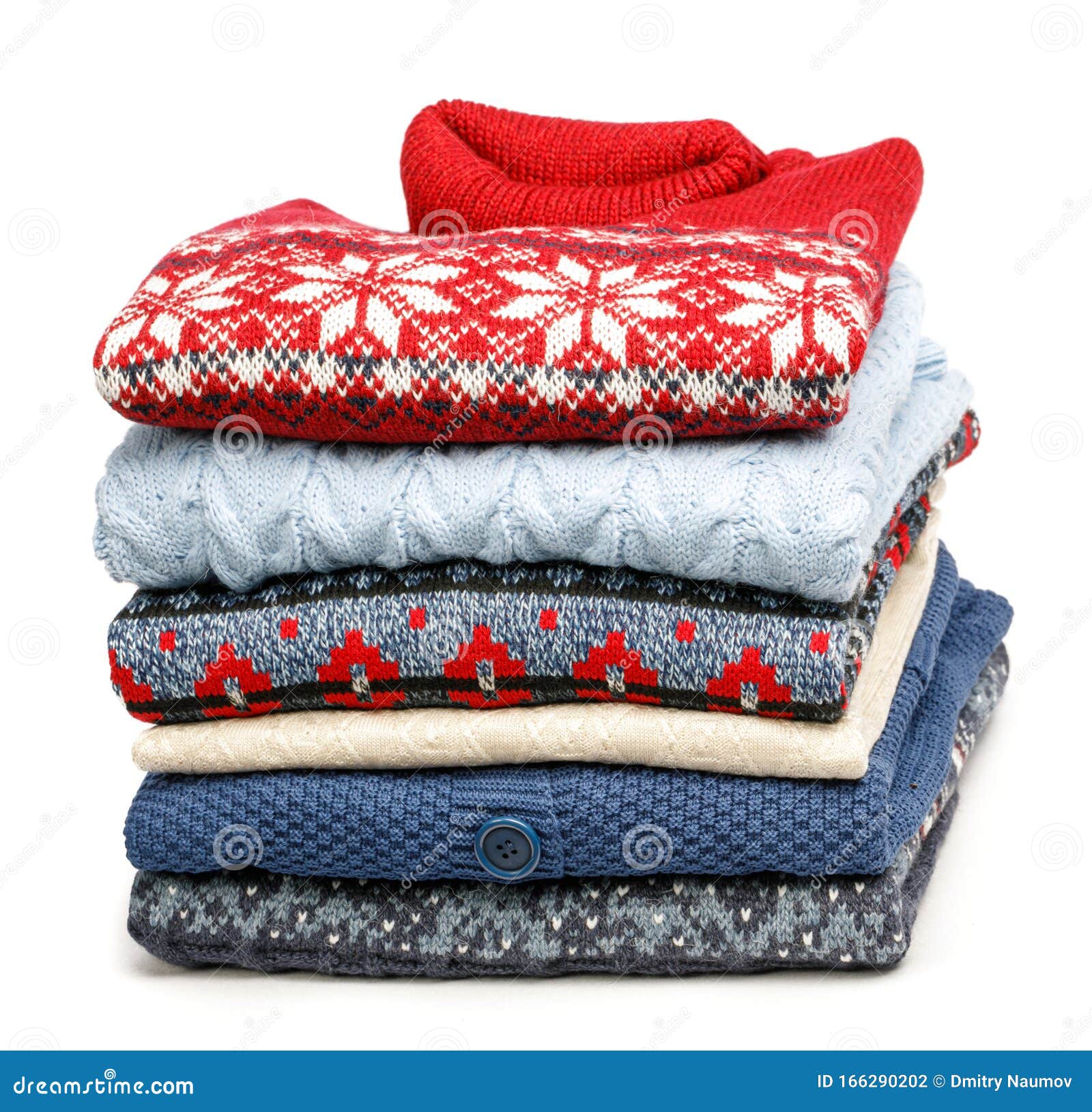 Stack of Folded Knitted Sweaters in a Store on White Background Stock ...