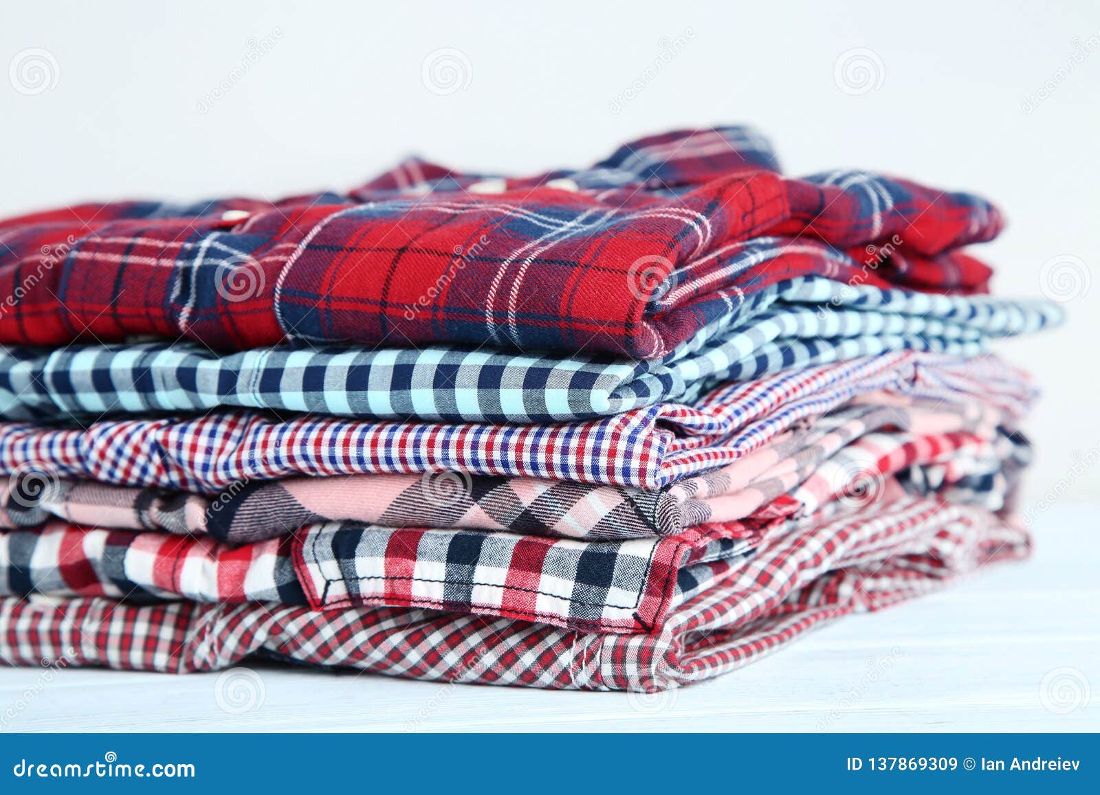 Folded shirts stock image. Image of heap, pattern, colorful - 137869309