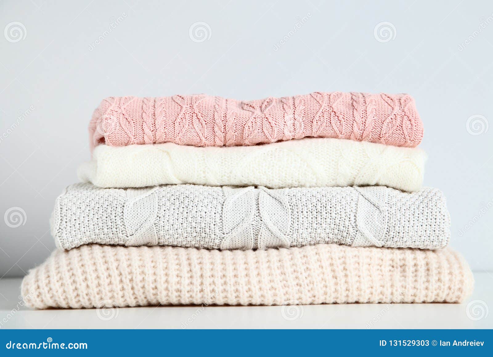 Folded sweaters stock image. Image of pattern, fabric - 131529303