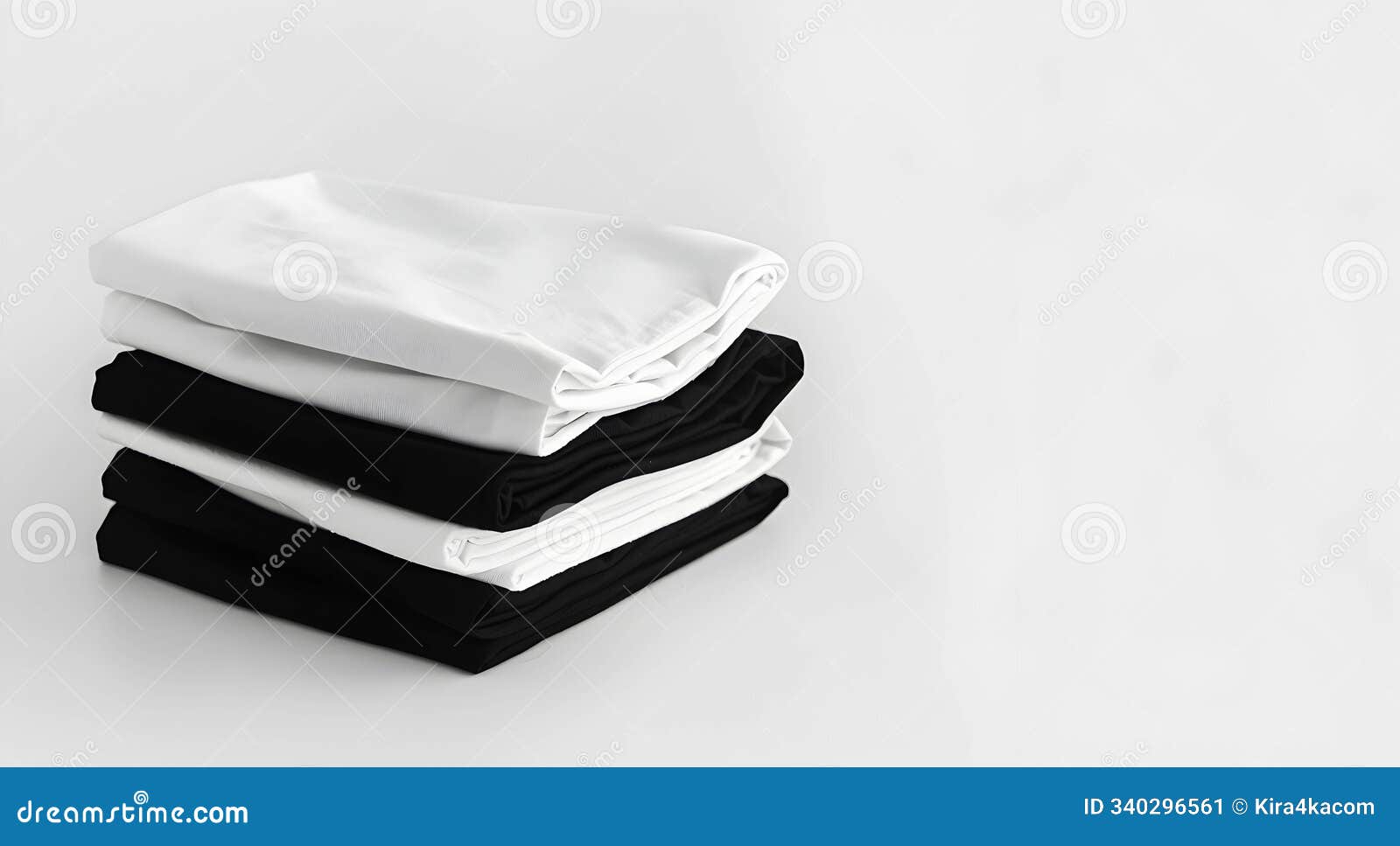 Stack of Folded T-shirts Black and White on a Plain Background. the ...