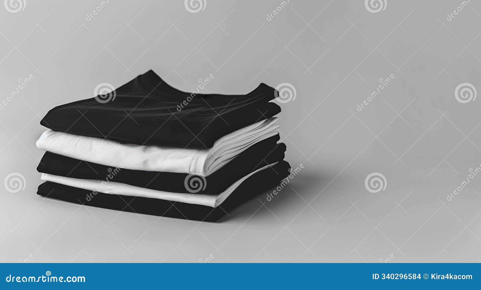 Stack of Folded T-shirts Black and White on a Plain Background. the ...