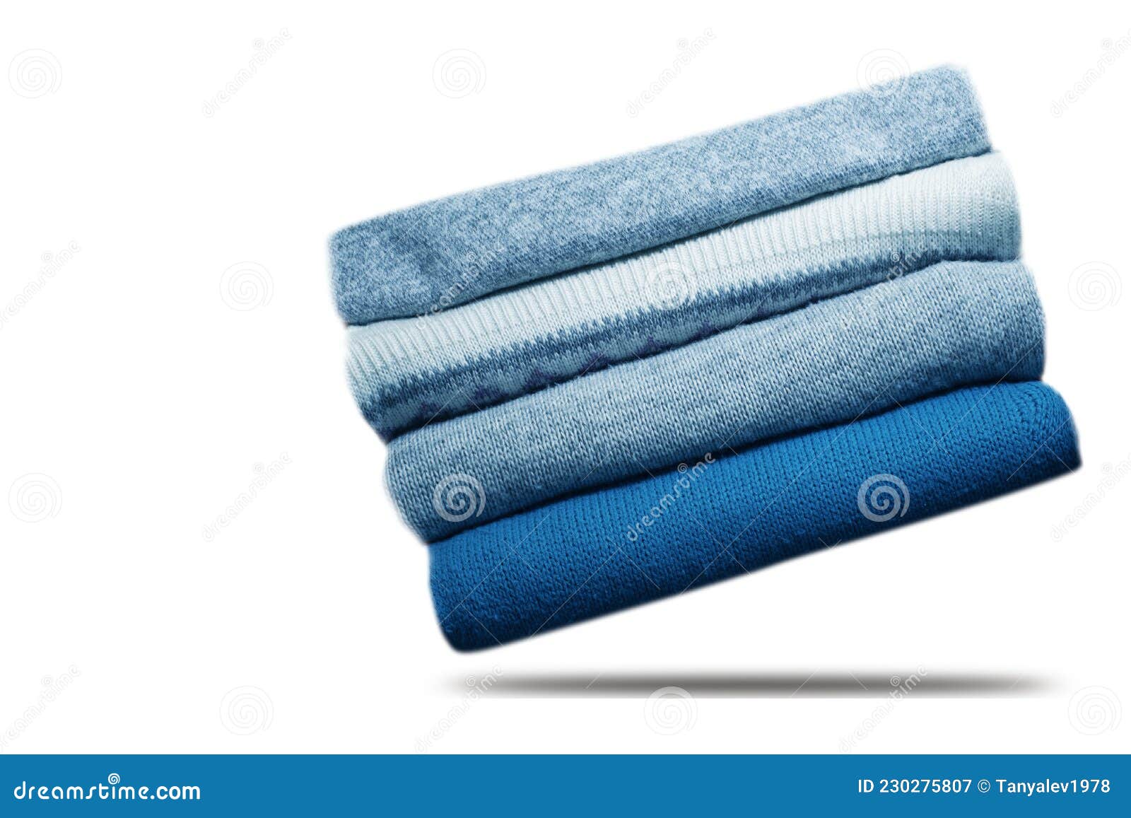 Stack of Folded Warm Clothes Fabric Isolated on White Background ...