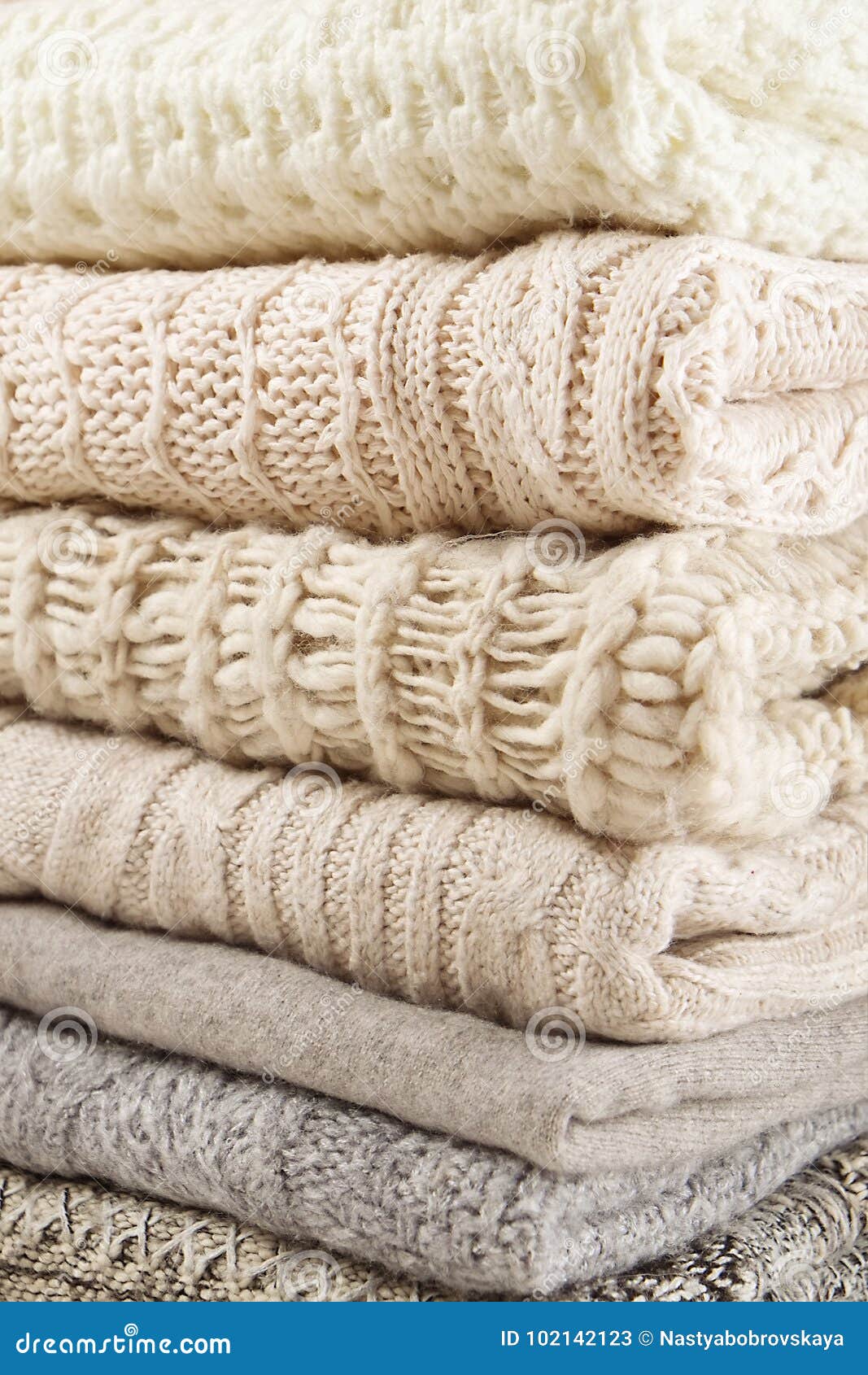 Stack of Warm Winter Clothes Close Up. Sweaters Background Texture ...