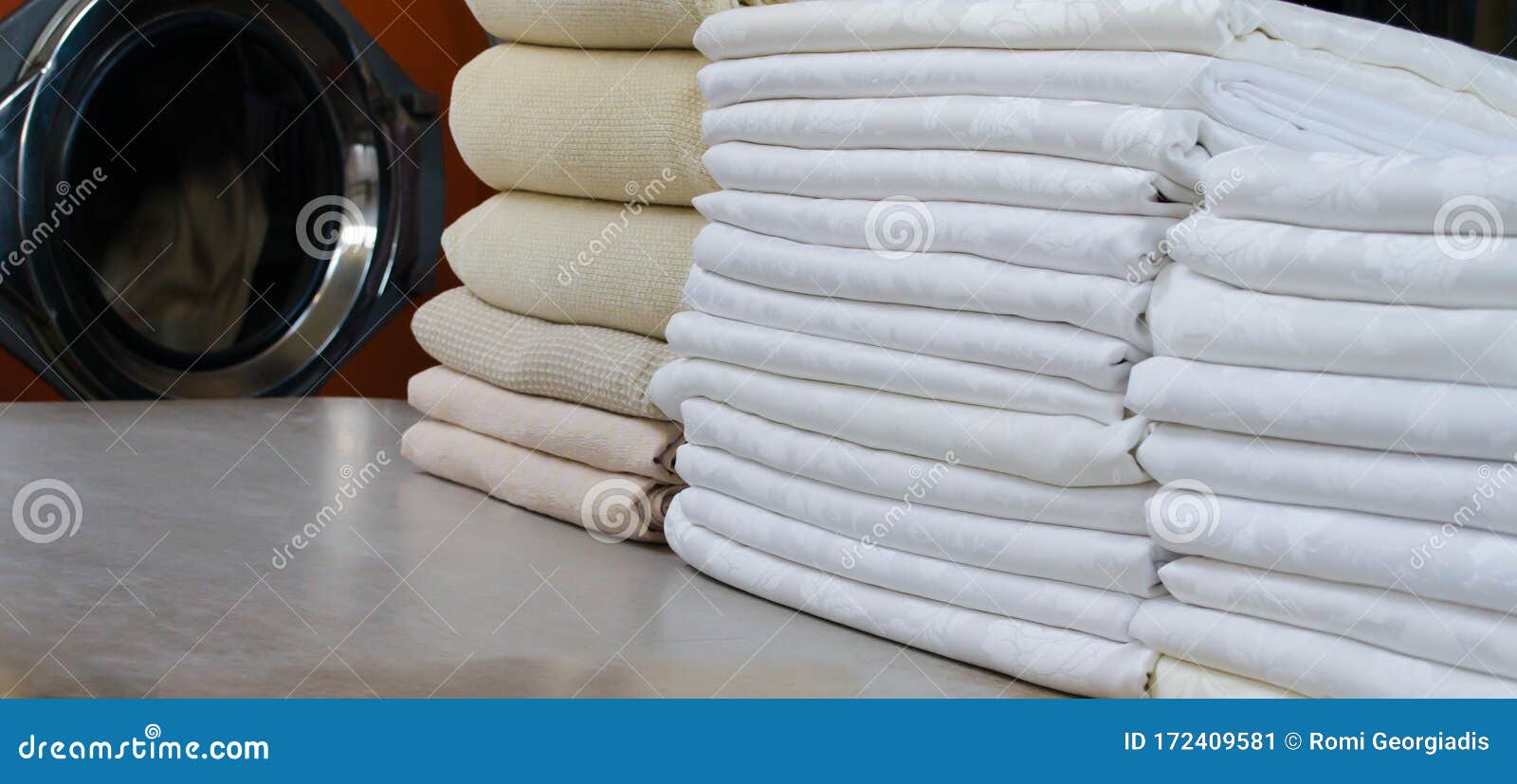 Stack of Folded White Cloths in an Industrial Laundry Stock Image ...