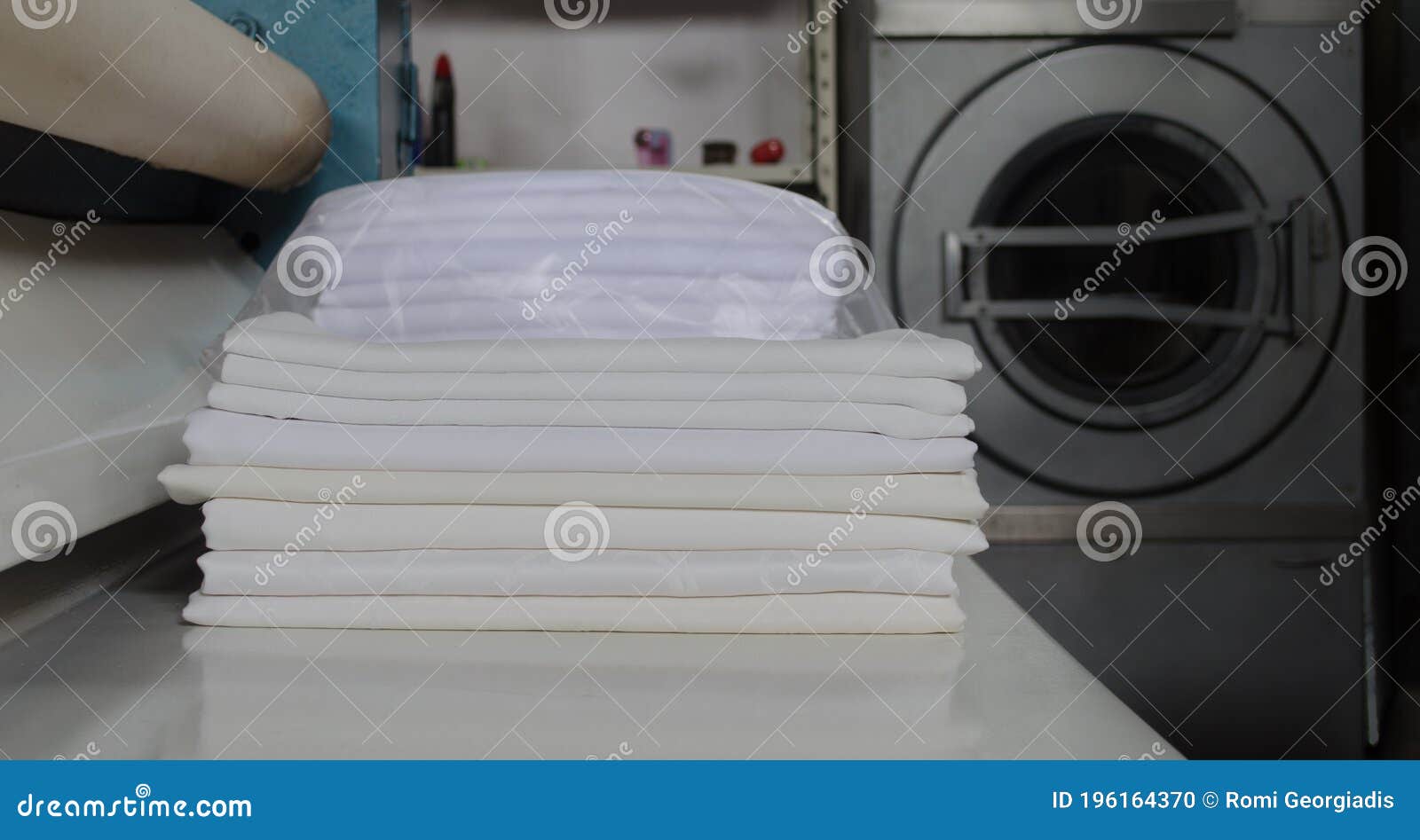 Stack of Folded White Fabrics in an Industrial Laundry Stock Photo ...