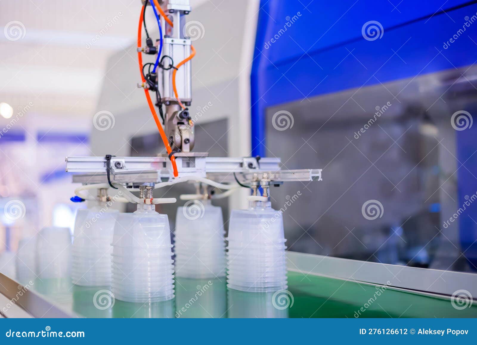 Stack of Food Containers on Conveyor Belt of Plastic Injection Molding ...