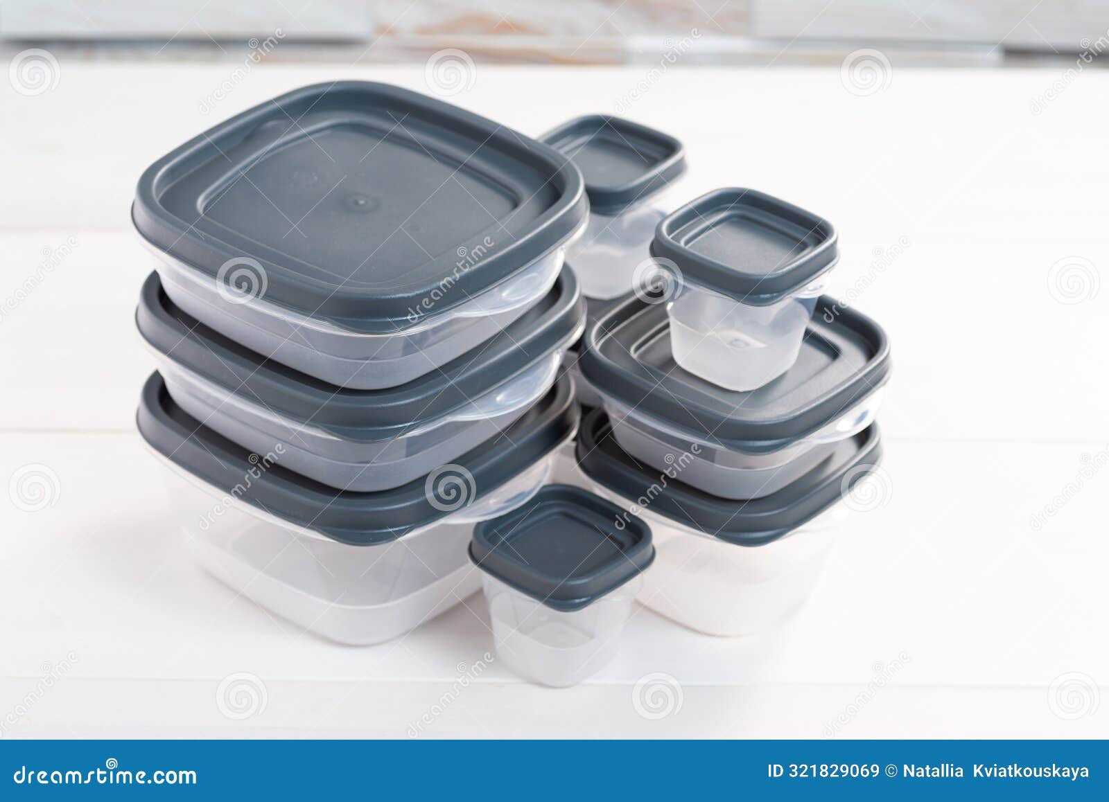 Stack of Food Plastic Containers of Different Sizes. Storing Food for ...