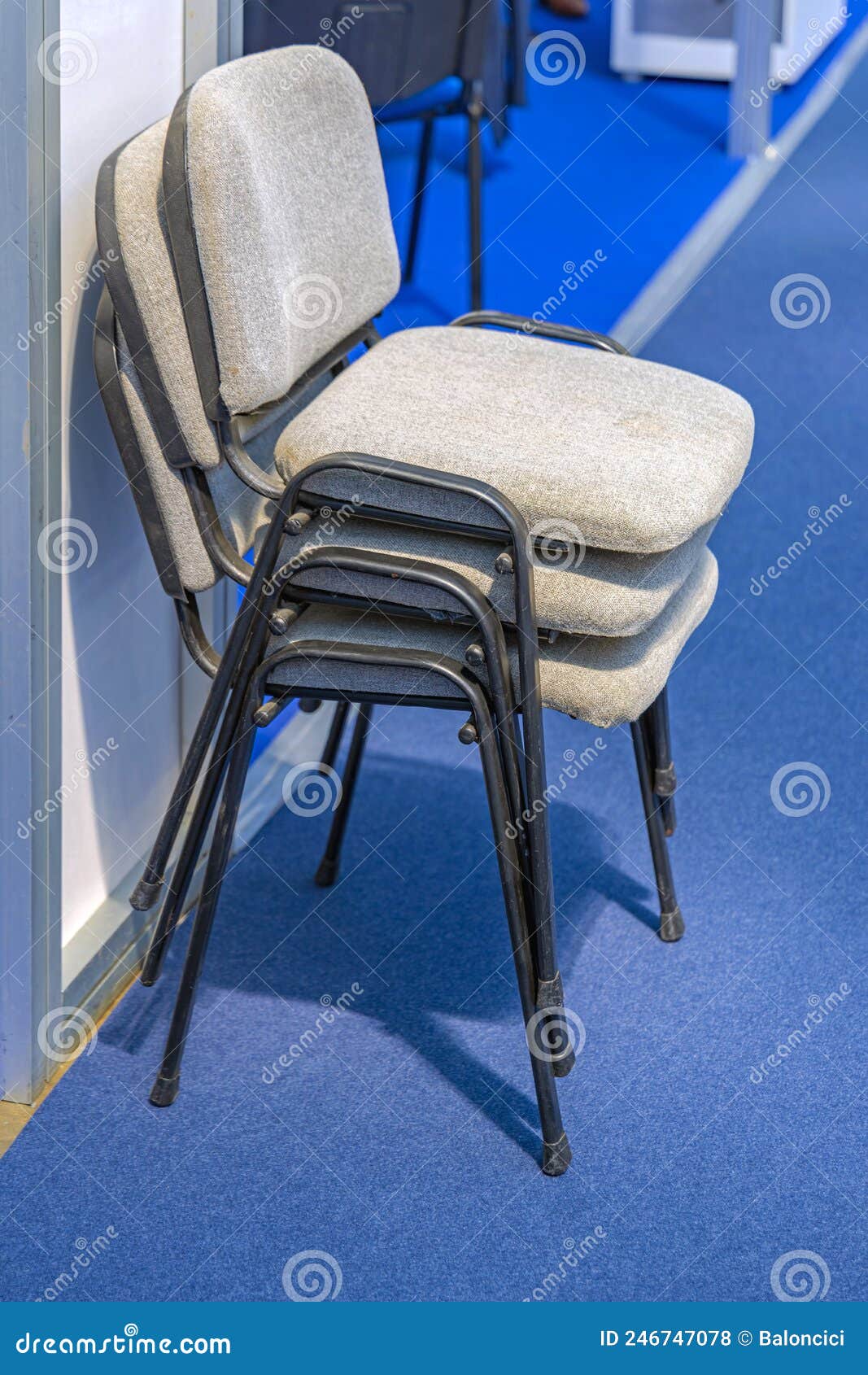 Stacked Office Chairs stock photo. Image of carpet, stack - 246747078