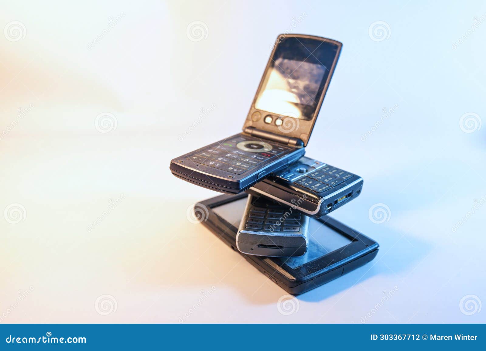 Stack of Four Old Mobile Phones, Short-lived Electronic Waste of ...