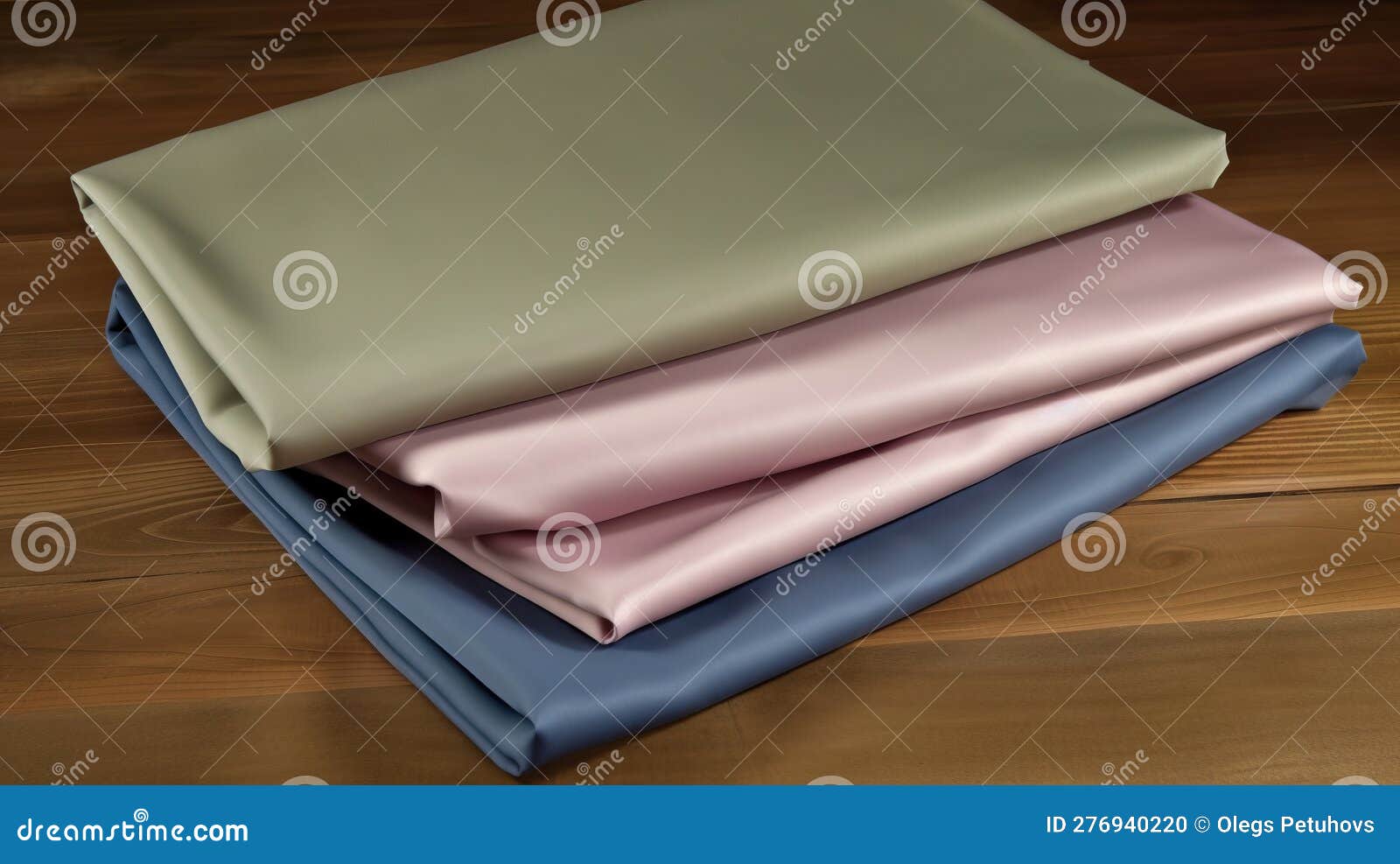 A Stack Of Four Sheets Of Different Colors On A Wooden Floor With A ...