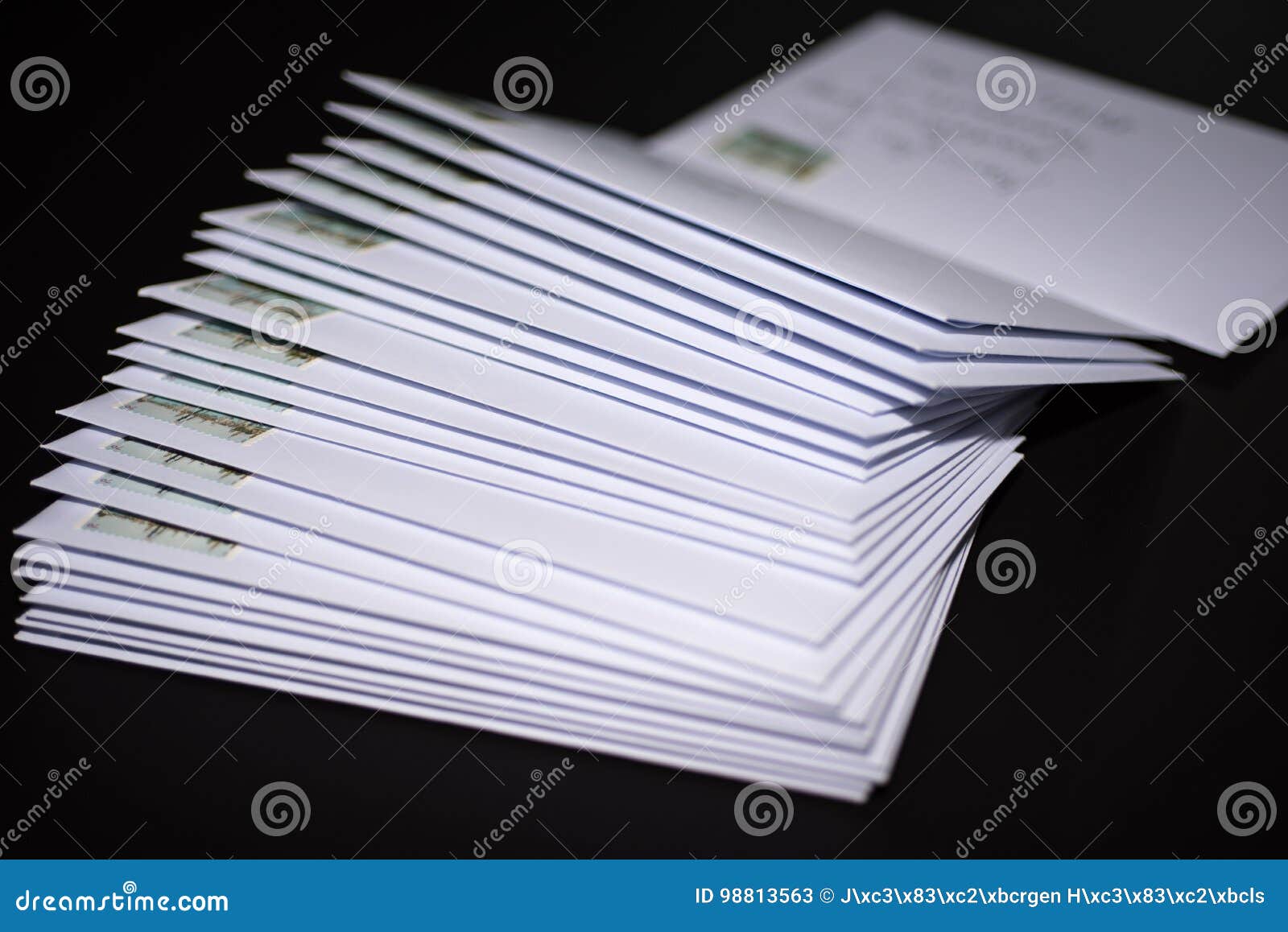Stack of Franked Letters in White Envelopes on Black Background Stock ...