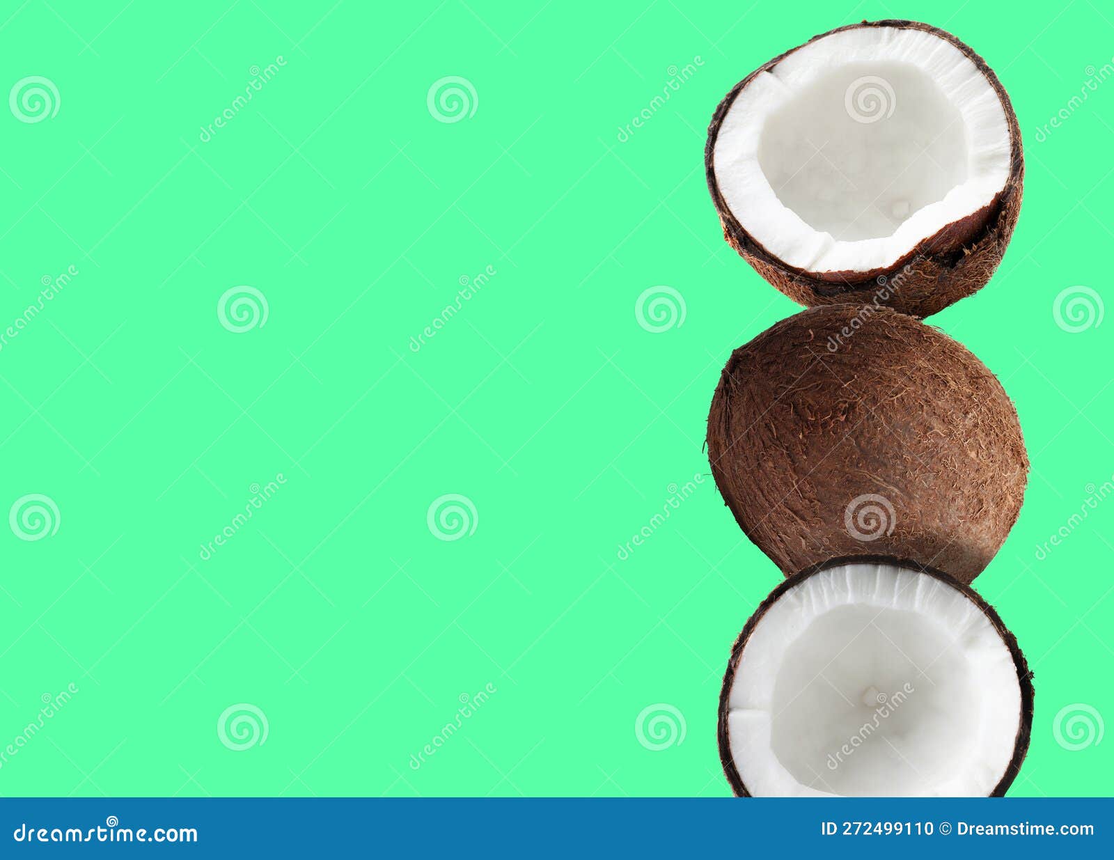Stack of Fresh Coconuts on Light Green Background. Space for Text Stock ...