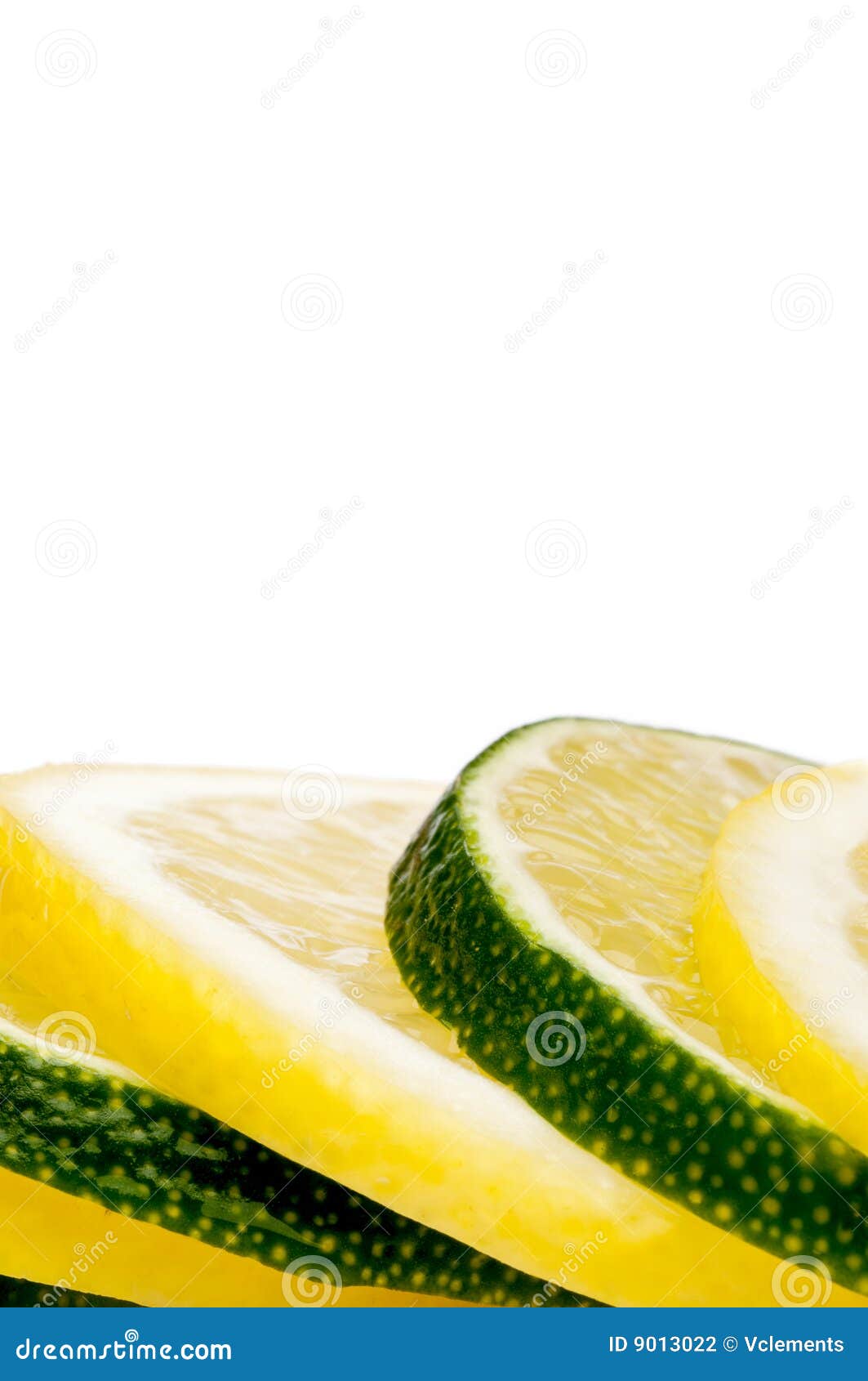 A Stack of Fresh Cut Lemon and Lime Stock Photo - Image of fruit, space ...
