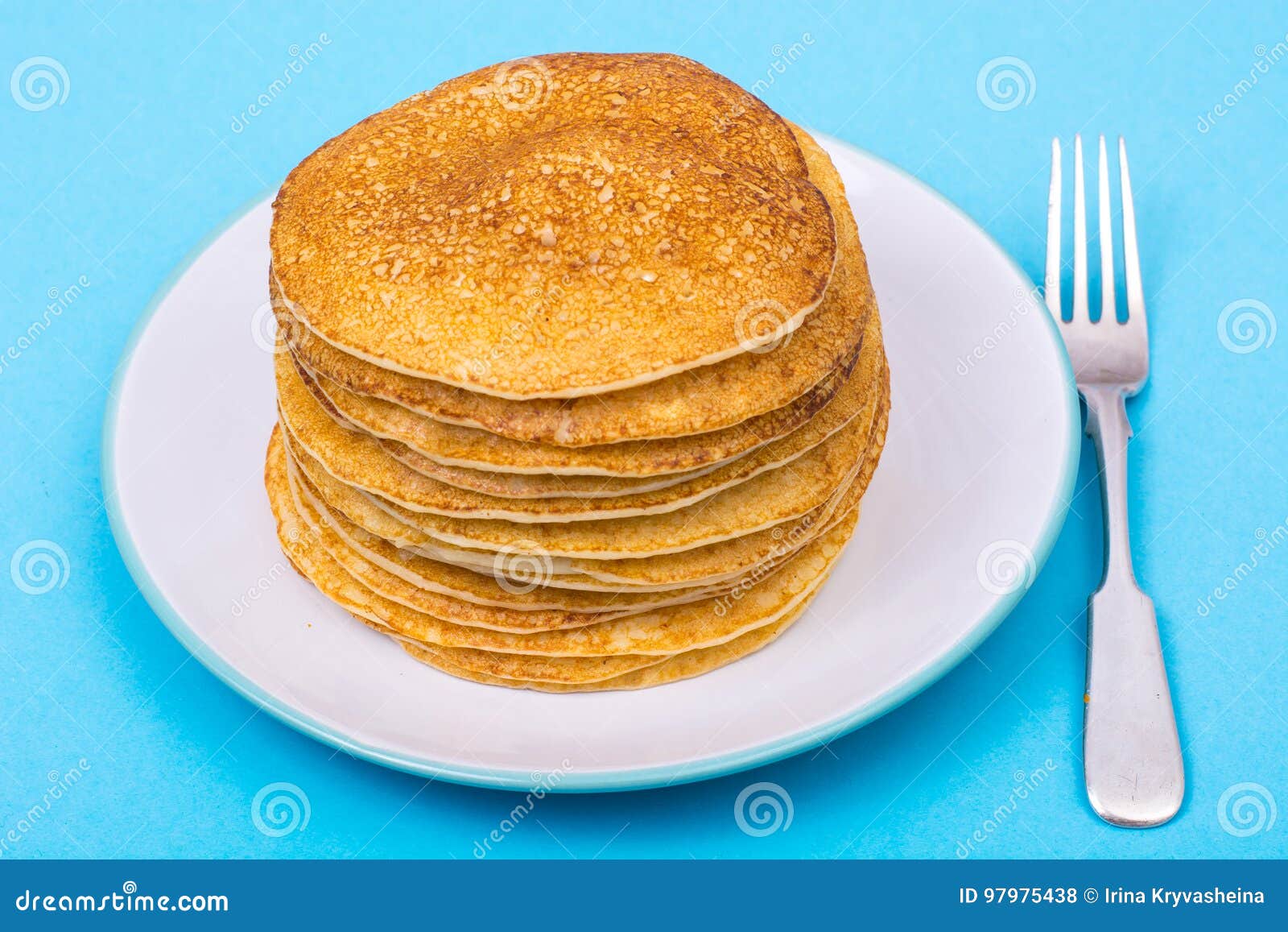 Stack of Fresh Delicious Pancakes on White Plate on Blue Background ...