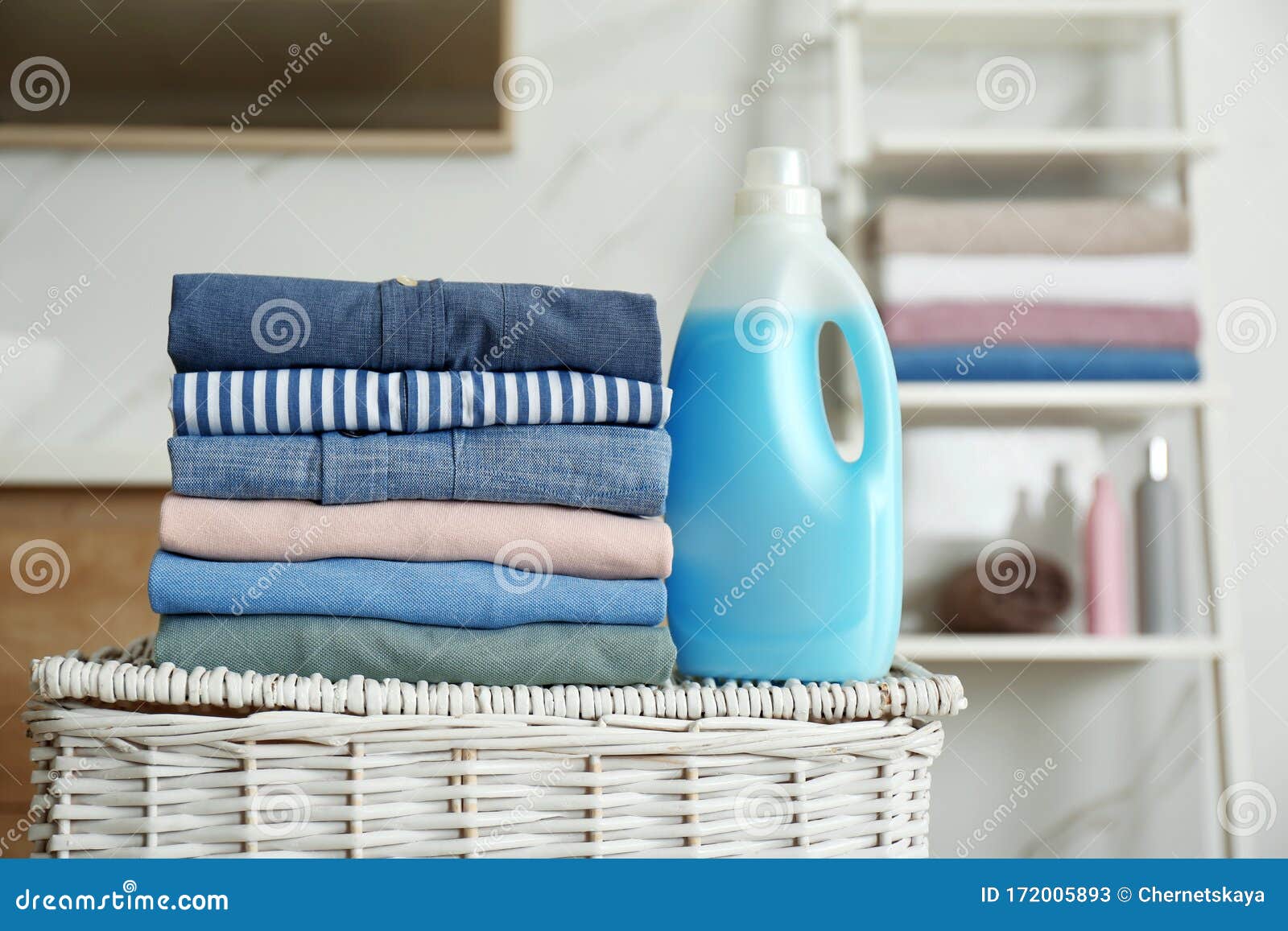 Stack of Fresh Laundry and Detergent on Basket Stock Image - Image of ...