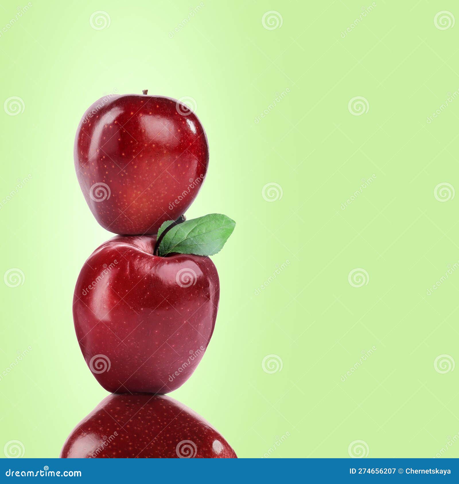 Stack of Fresh Ripe Red Apples on Pastel Green Background, Space for ...
