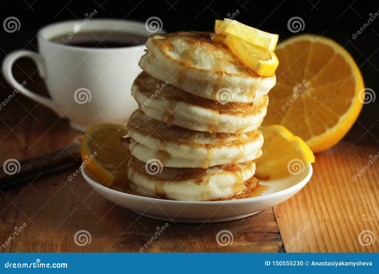 A Stack of Freshly Backed Pancakes and a Cup of Coffee Stock Photo ...