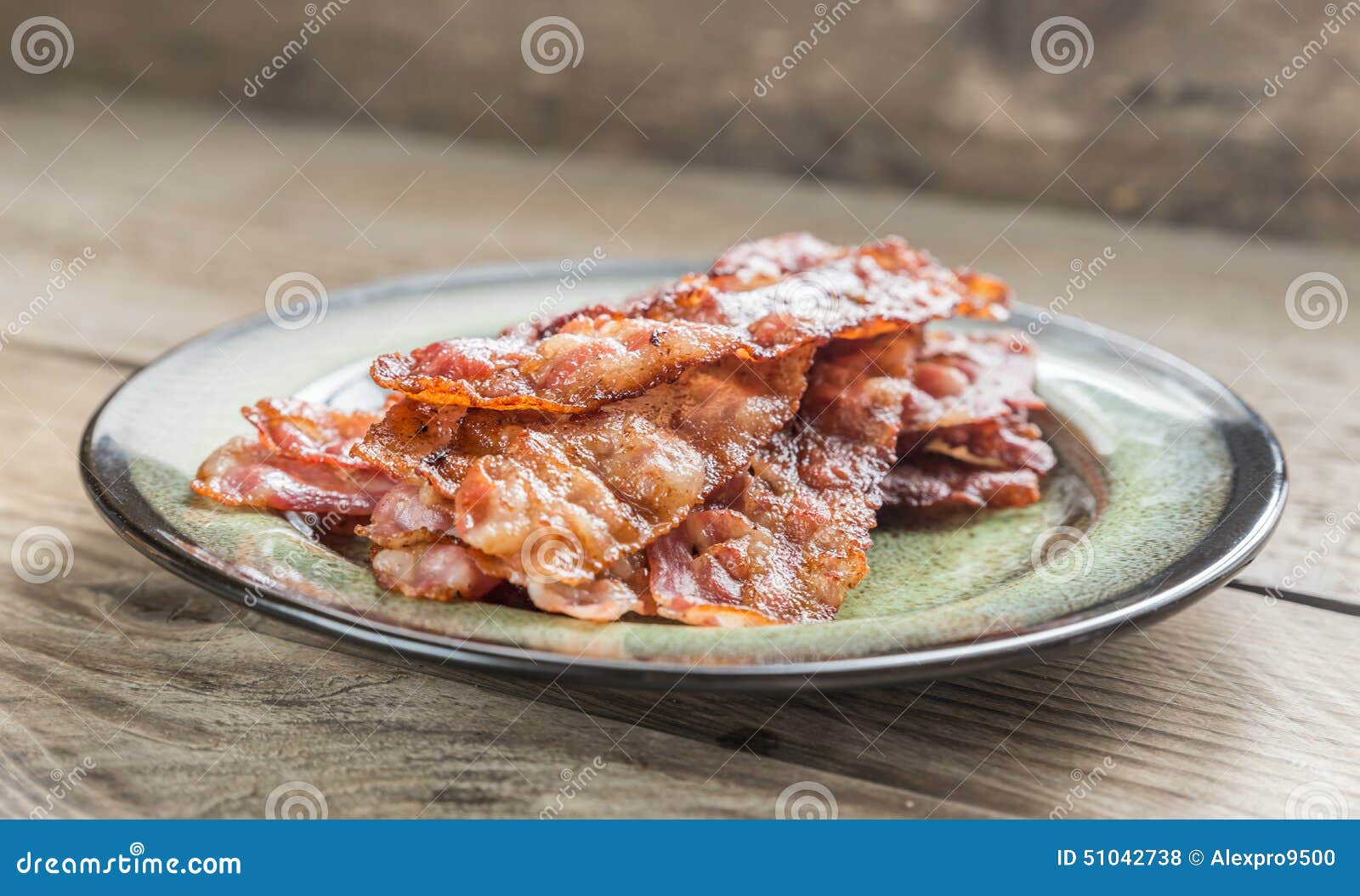 Stack of Fried Bacon Strips on the Plate Stock Photo - Image of bacon ...