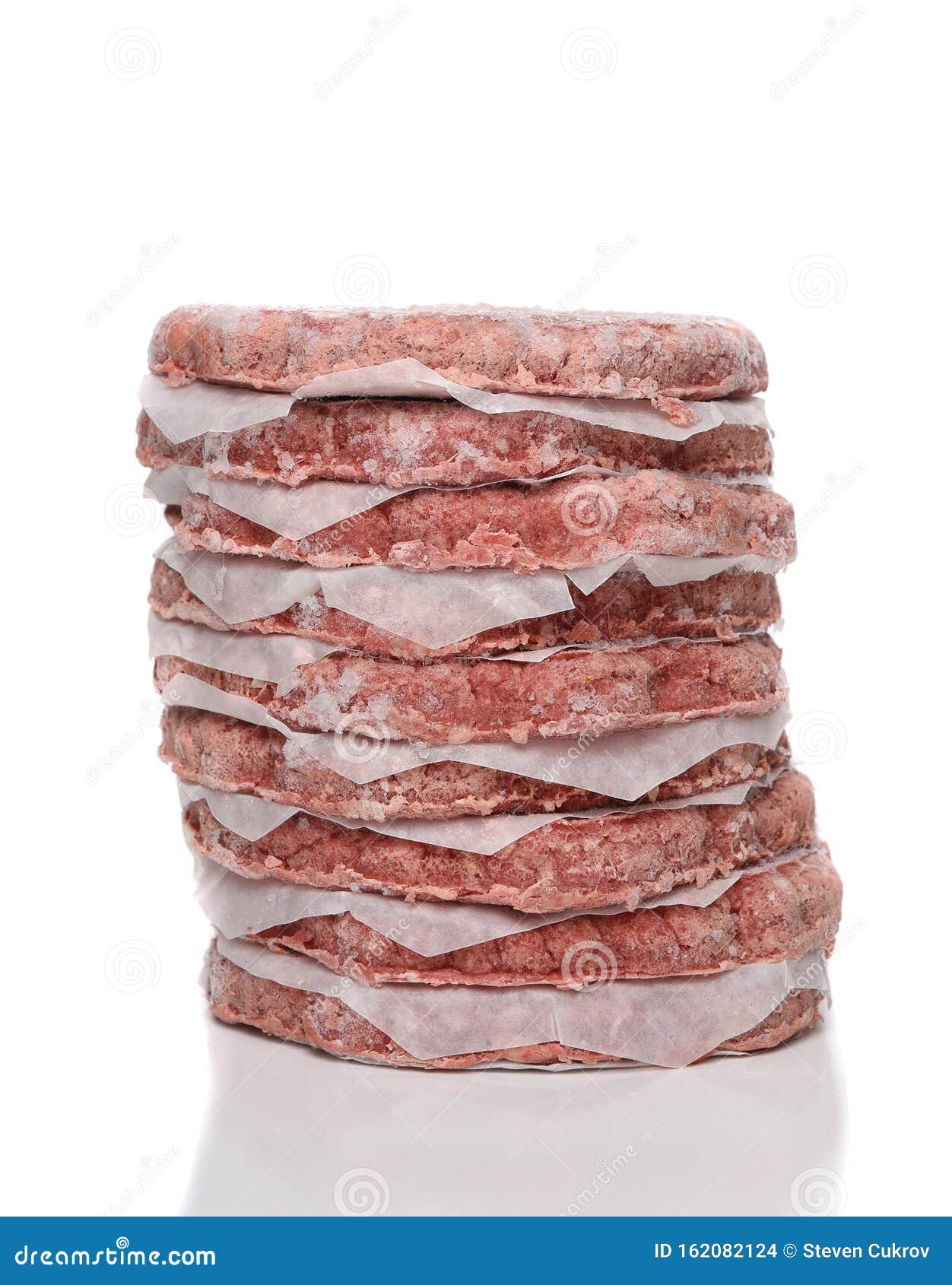 A Stack of Frozen Hamburger Patties Isolated on White with Reflection ...