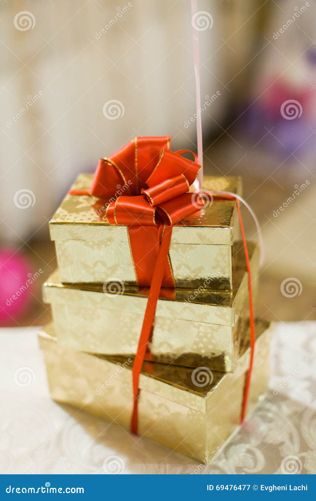 A stack of gold gift boxes stock image. Image of brightly - 69476477