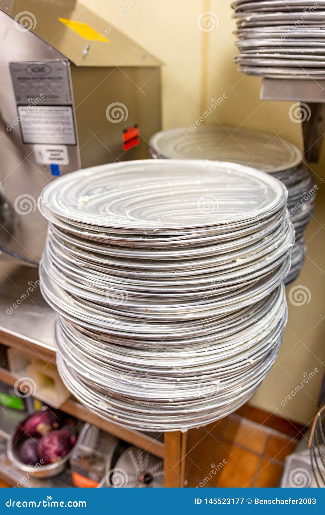 Stack of pizza pans stock image. Image of pans, food - 145523177