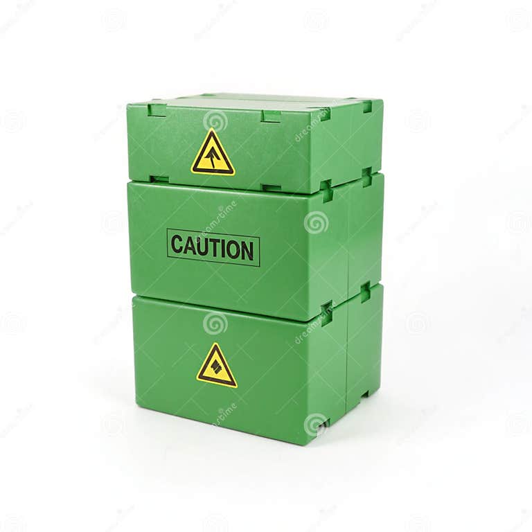 Stack of Green Boxes with a Caution Label on Transparent Background ...