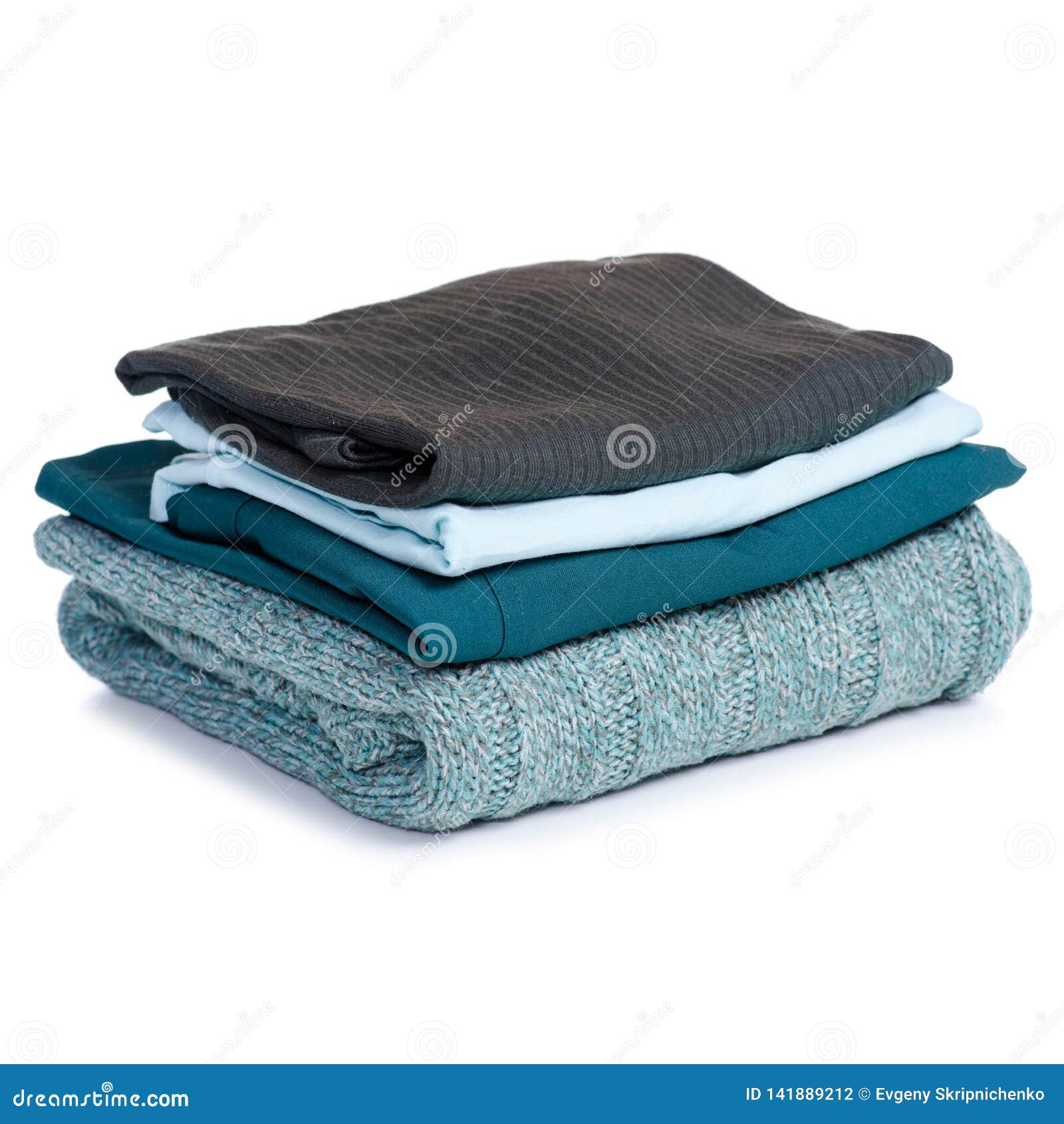 Stack green clothes stock photo. Image of garment, clothes - 141889212