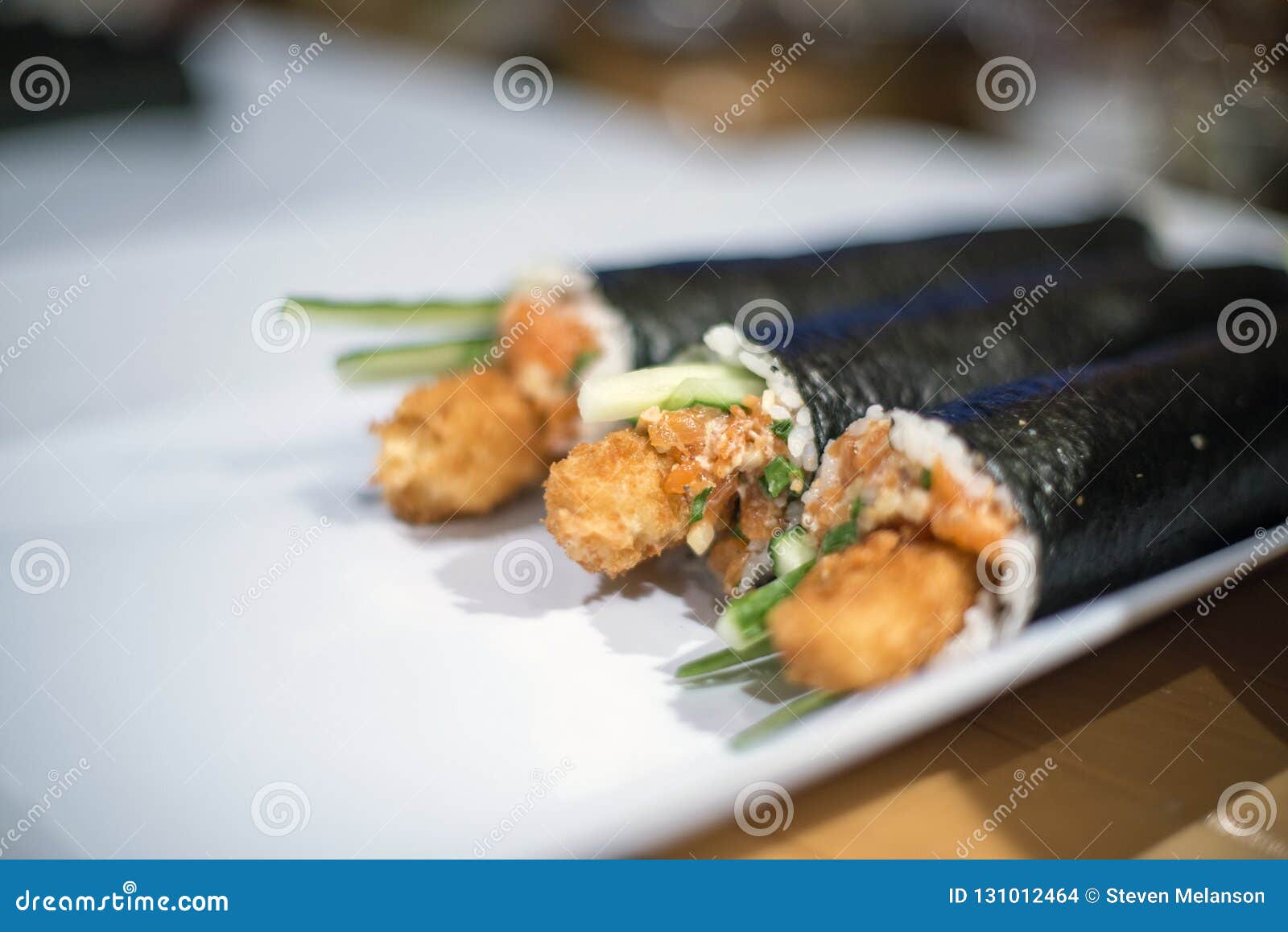 Hand sushi rolls stock photo. Image of seaweed, rolled - 131012464