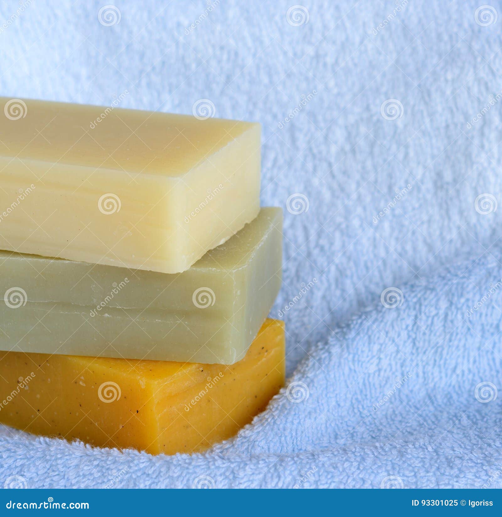 Stack of Handmade Soap Bars on Blue Bath Towel Stock Image - Image of ...