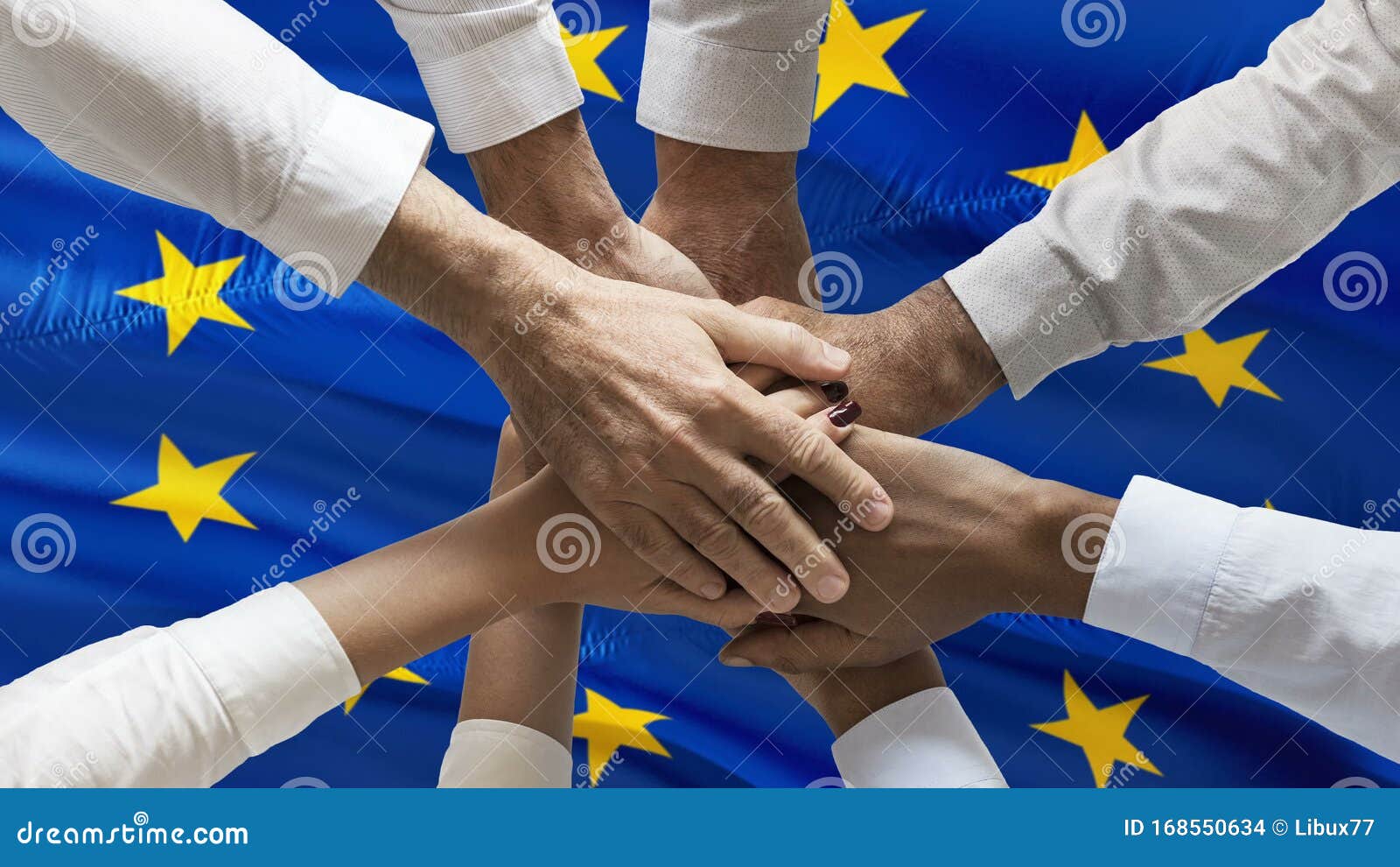 Stack of Hands Showing Unity and Teamwork Over Waving European Union ...